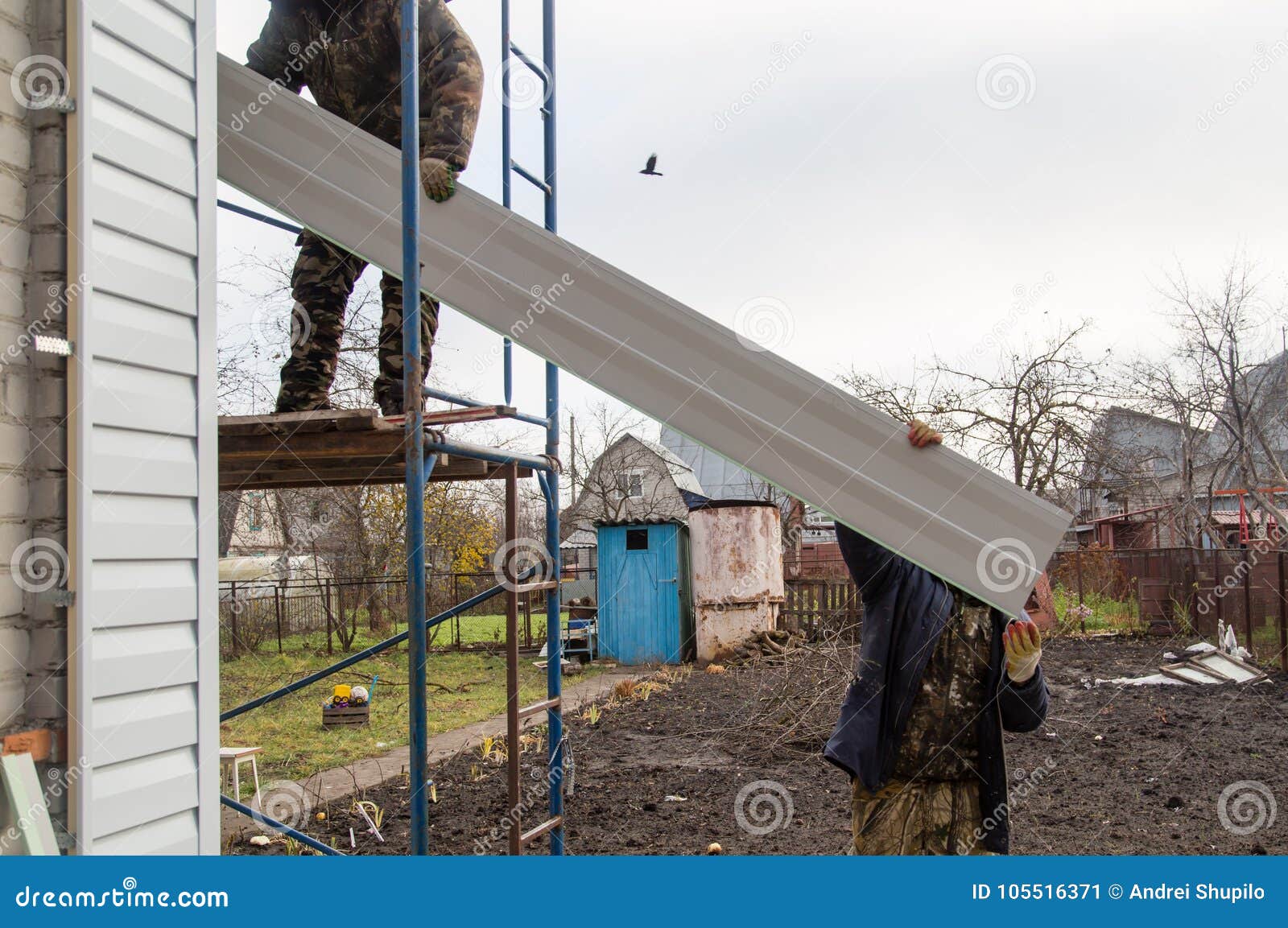 Workers Walling the House with Wall Siding Stock Image - Image of ...