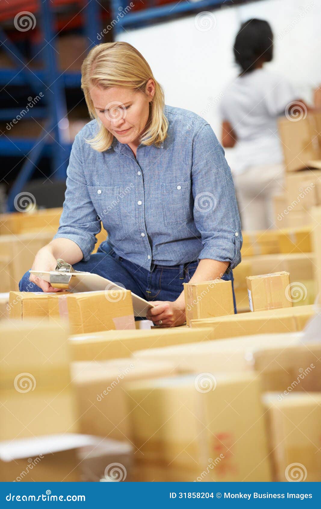 Workers in Warehouse Preparing Goods for Dispatch Stock Photo - Image ...