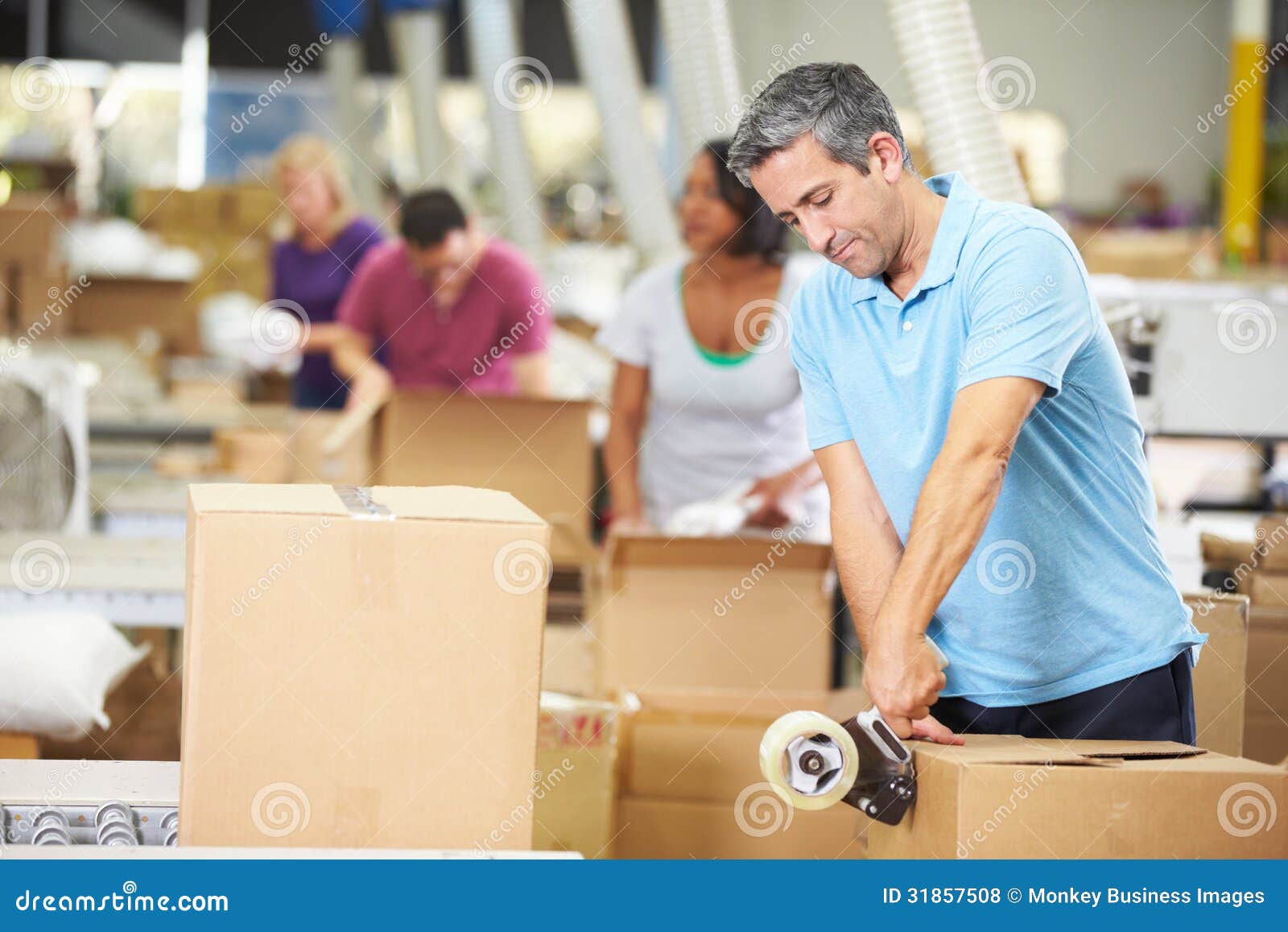Workers in Warehouse Preparing Goods for Dispatch Stock Photo - Image ...