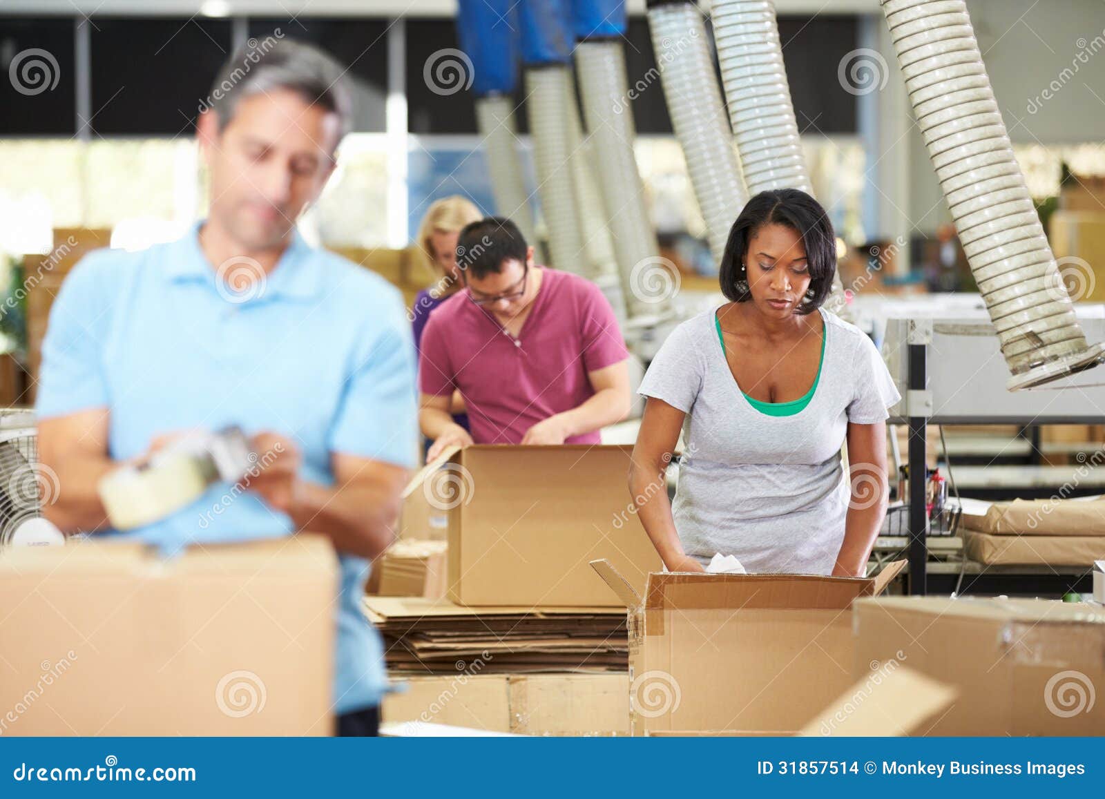 Workers in Warehouse Preparing Goods for Dispatch Stock Photo - Image ...