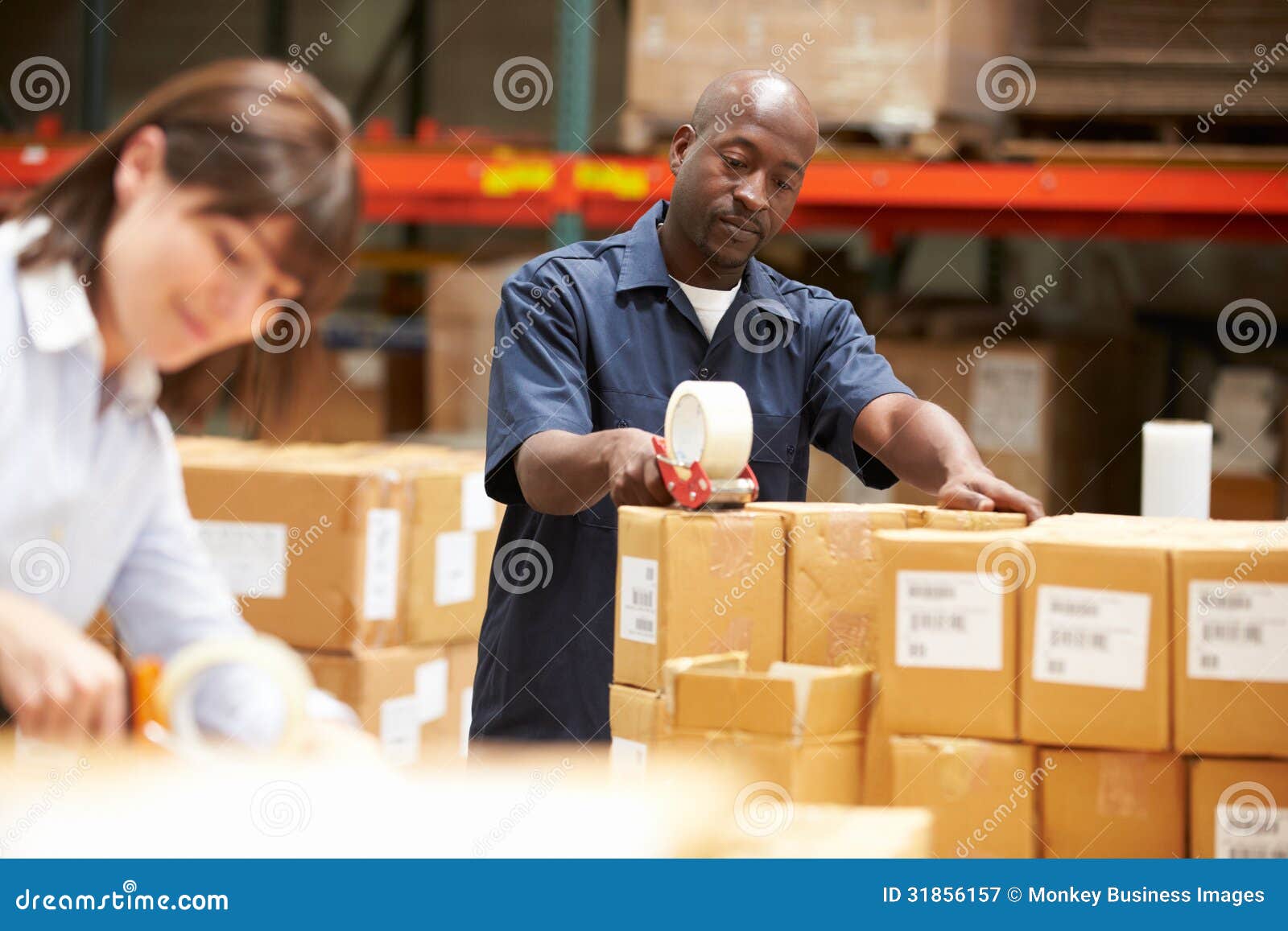 Workers in Warehouse Preparing Goods for Dispatch Stock Image - Image ...