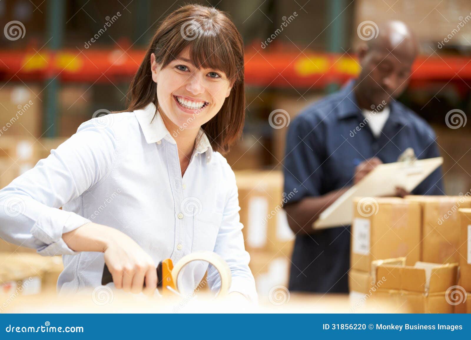 Workers in Warehouse Preparing Goods for Dispatch Stock Photo - Image ...
