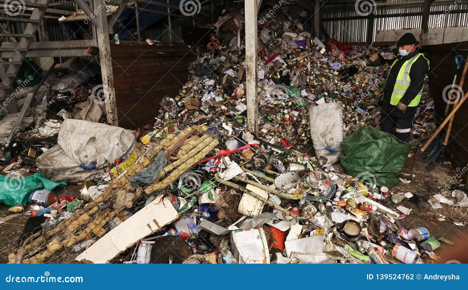 Workers at the Waste Processing Plant. Sorting Trash on a Conveyor Belt ...
