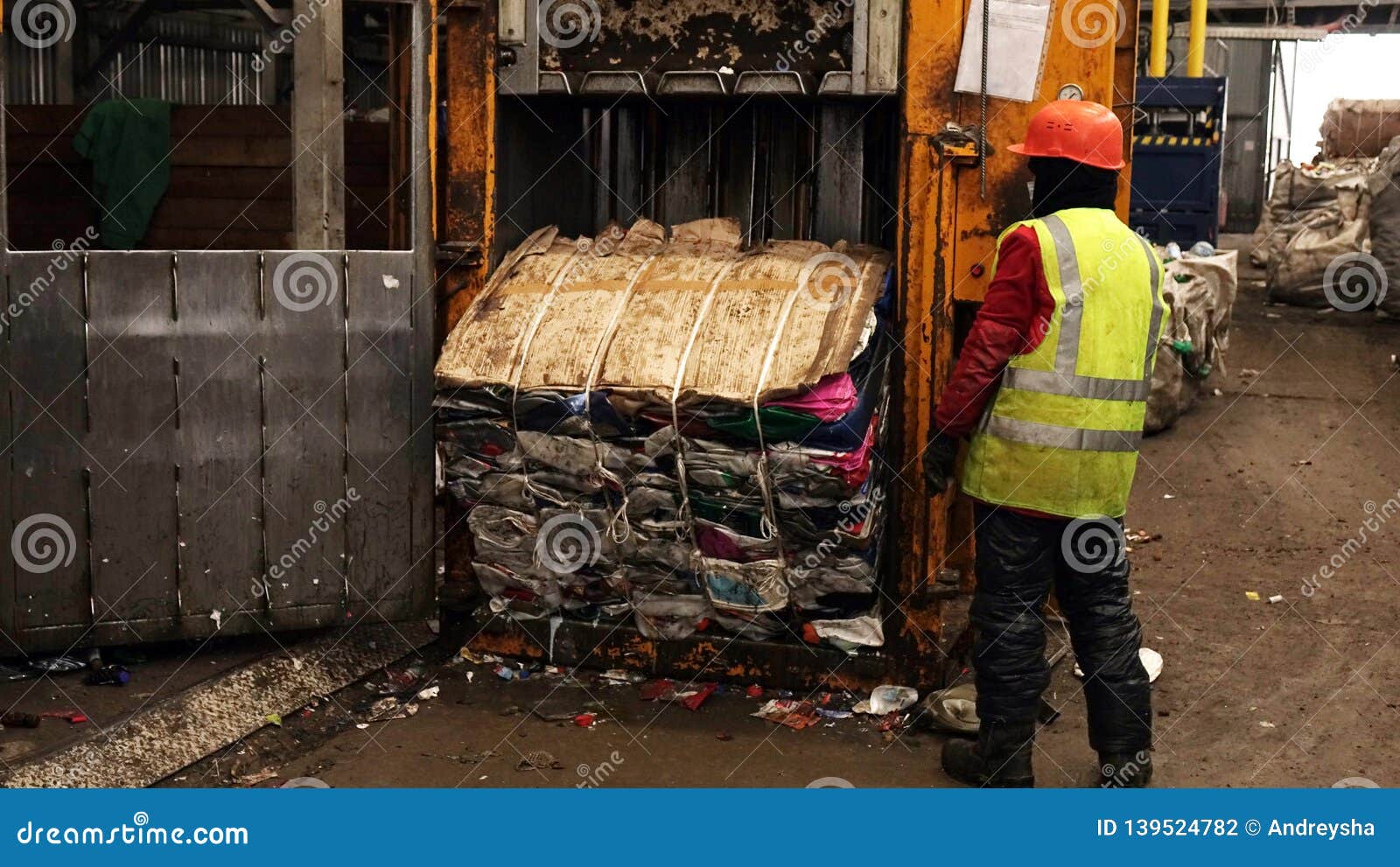 Workers at the Waste Processing Plant. Sorting Trash on a Conveyor Belt ...