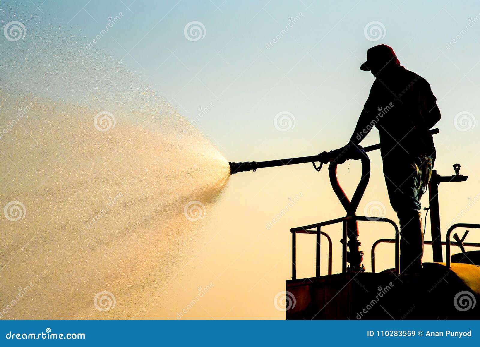Workers on Water Truck are Spraying Water on the Road Stock Image ...