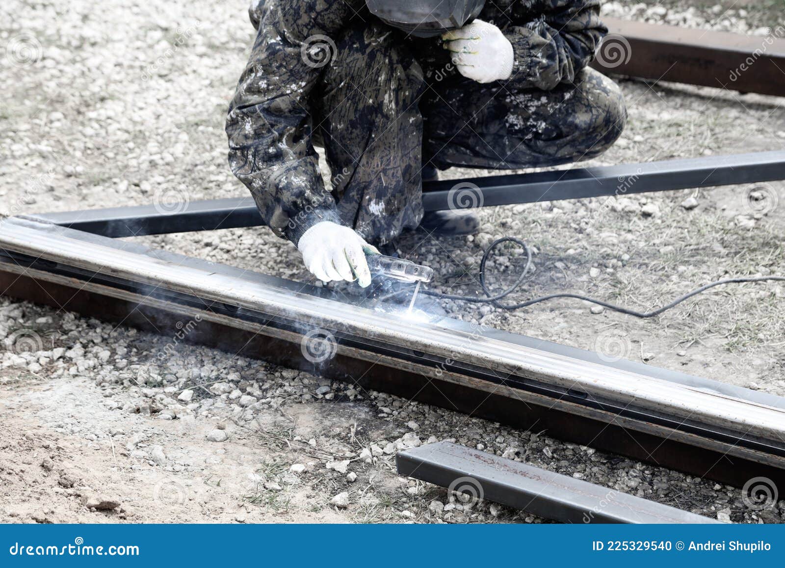 Workers Weld Metal for Sliding Gates. Stock Photo - Image of rail ...