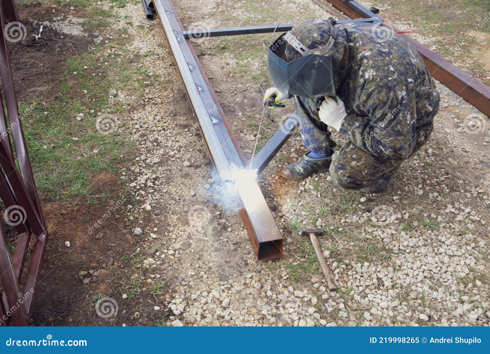 Workers Weld Metal for Sliding Gates. Stock Image - Image of welding ...