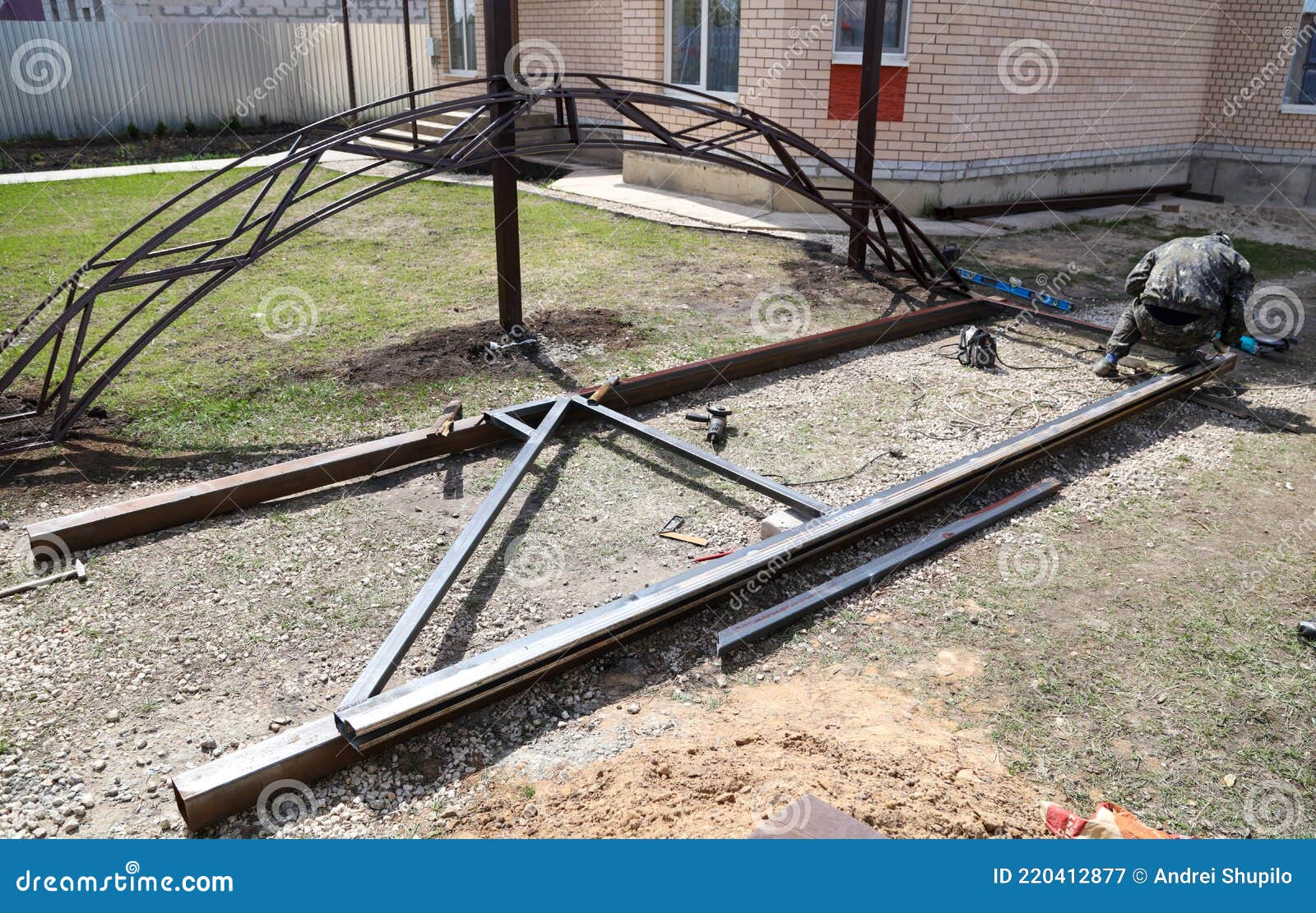 Workers Weld Metal for Sliding Gates. Stock Image - Image of worker ...