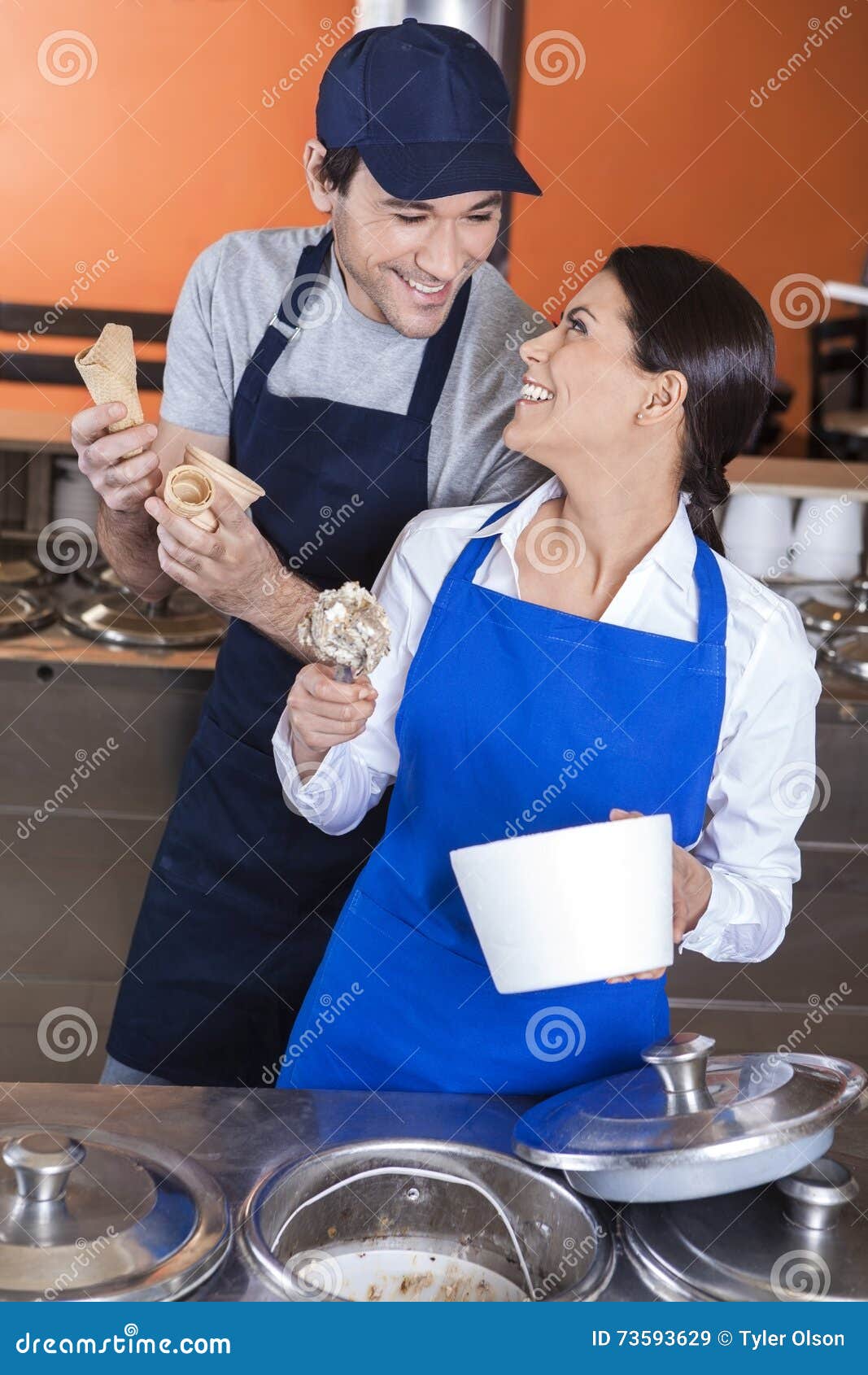 Workers Working at Counter in Parlor Stock Image - Image of happy ...