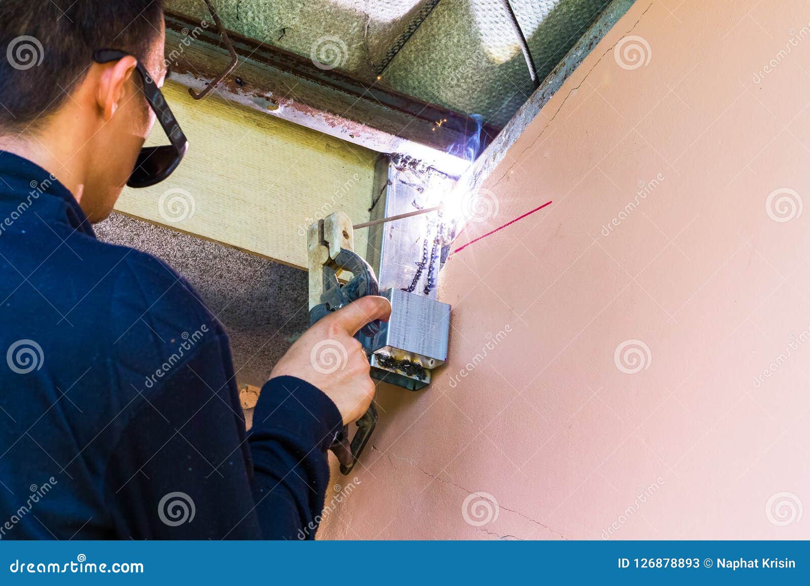 Workers are Working by Using a Welding Machine. Stock Image - Image of ...
