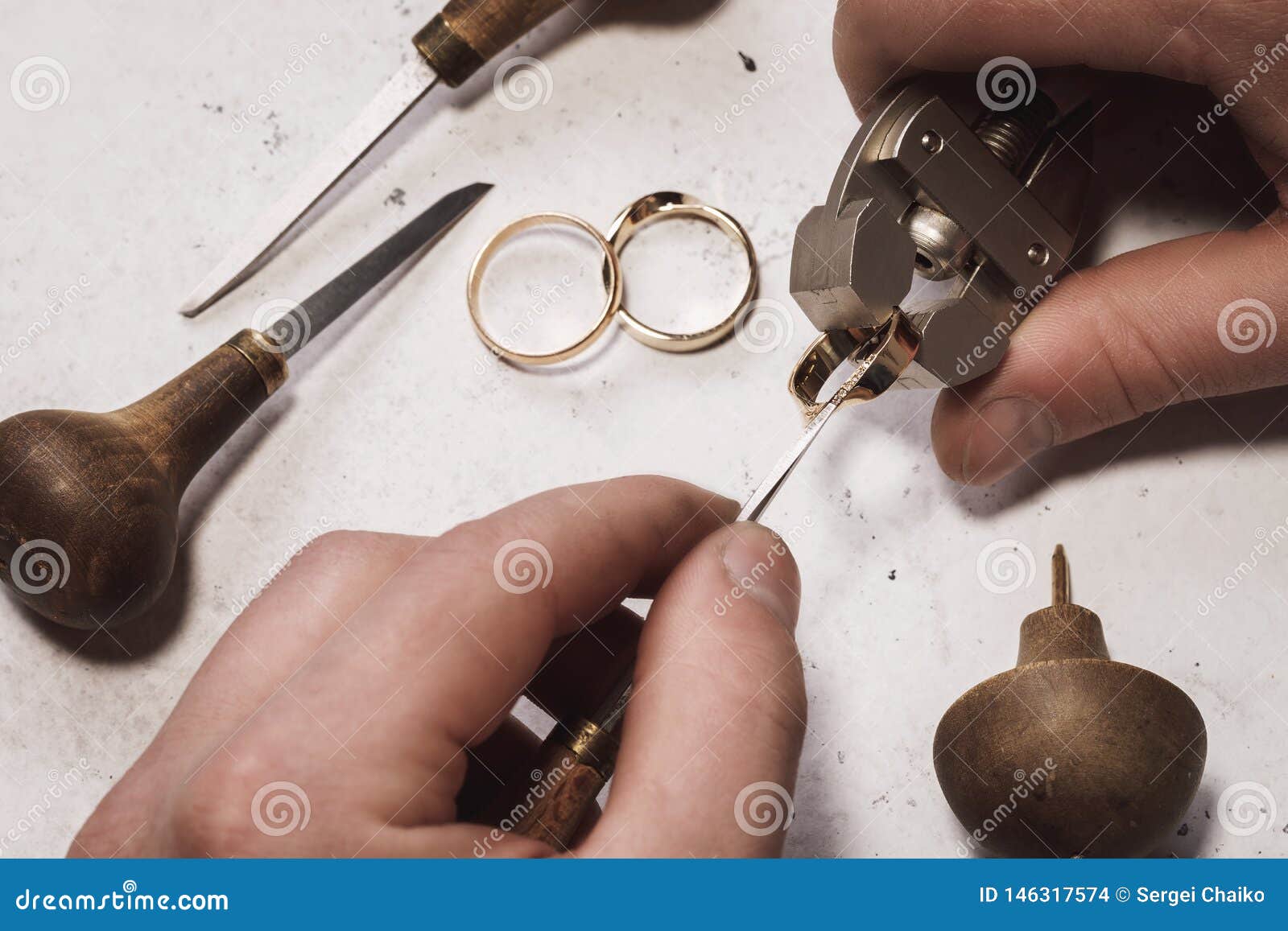 Workflow of Repairing a Gold Ring with Precious Stones, Closeup Stock ...