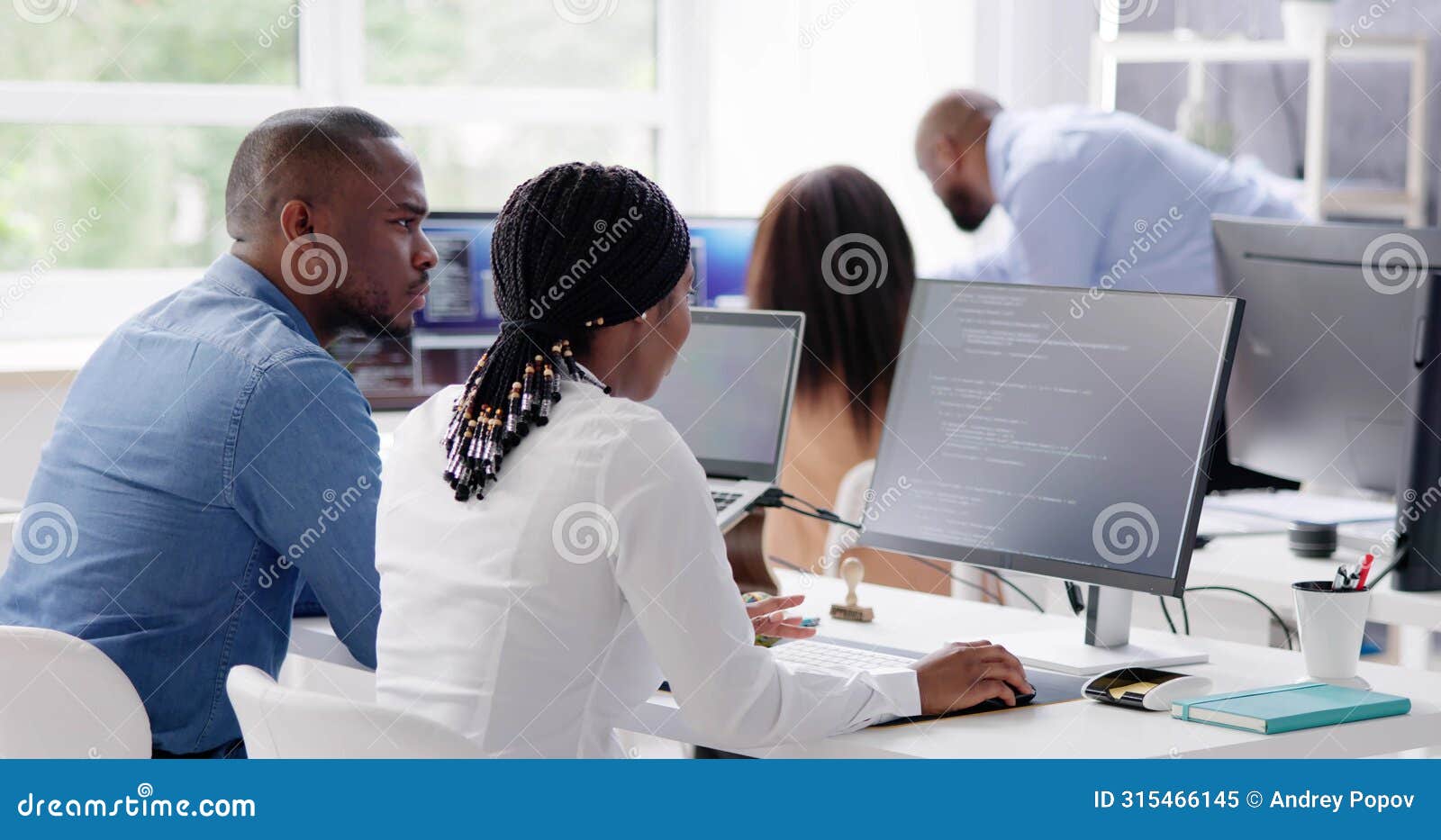 Working African Business Team of Programmers Coding Stock Image - Image ... Working African Business Team of Programmers Coding Stock Image - Image ...