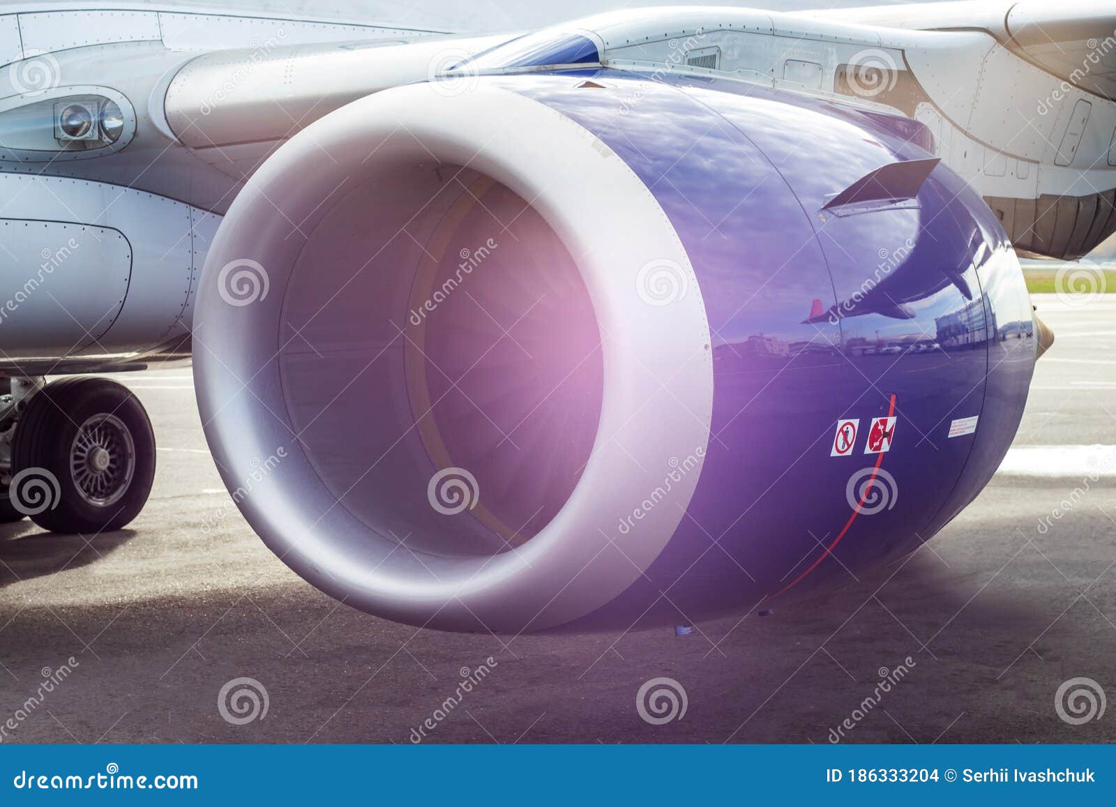 Working aircraft engine. stock photo. Image of airport - 186333204