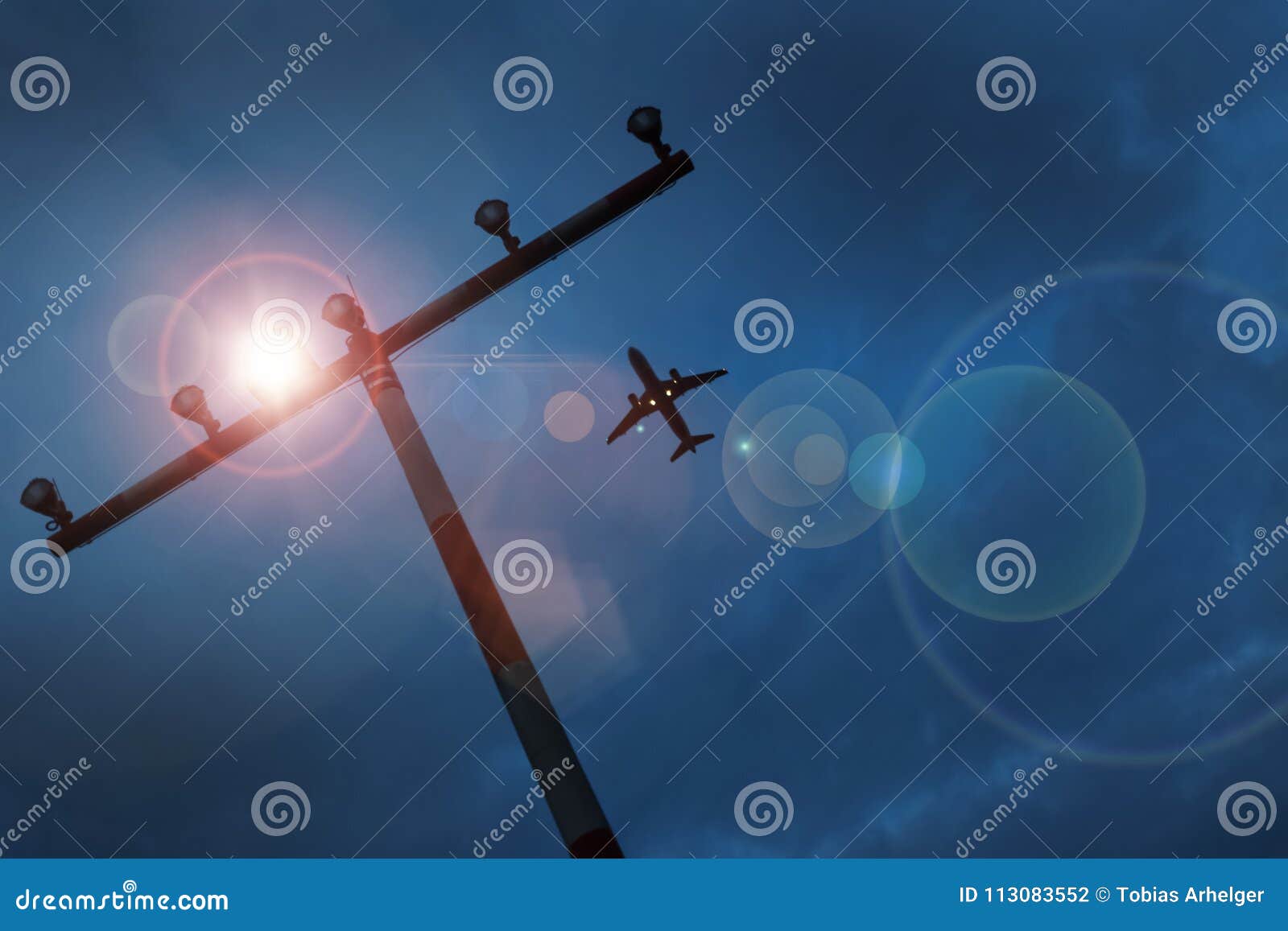 Working Airport Beacons with Starting Airplane in the Evening Stock ...