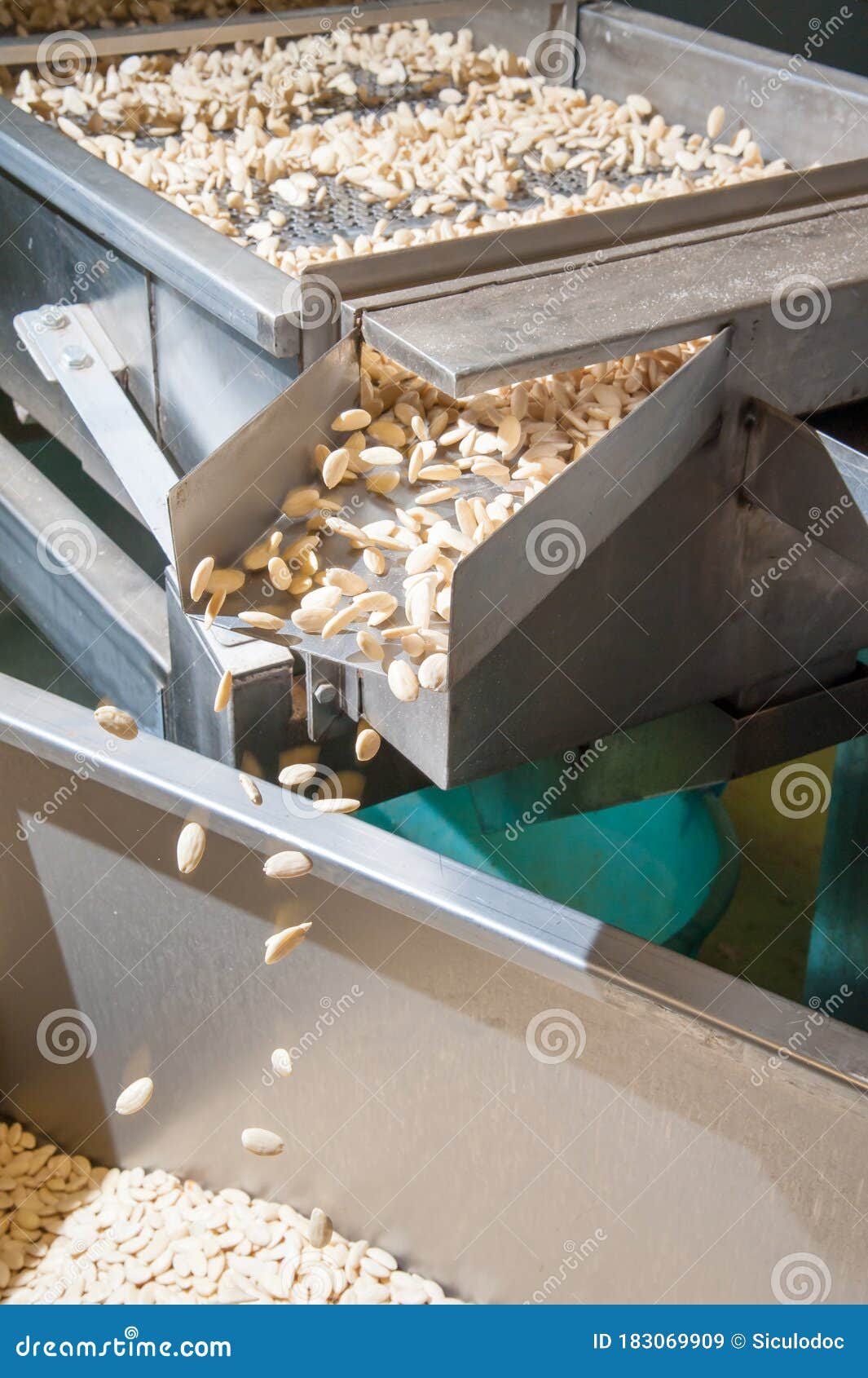 The working of almonds stock image. Image of modern - 183069909