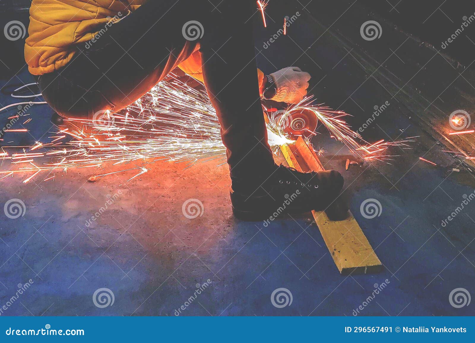 Working with an Angle Grinder. Violation of Safety Regulations Stock ...