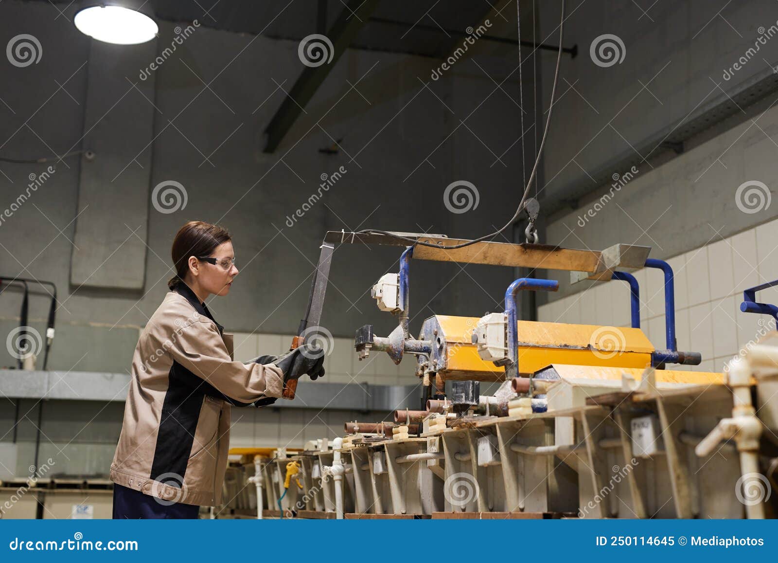 Working at assembly line stock image. Image of standing - 250114645