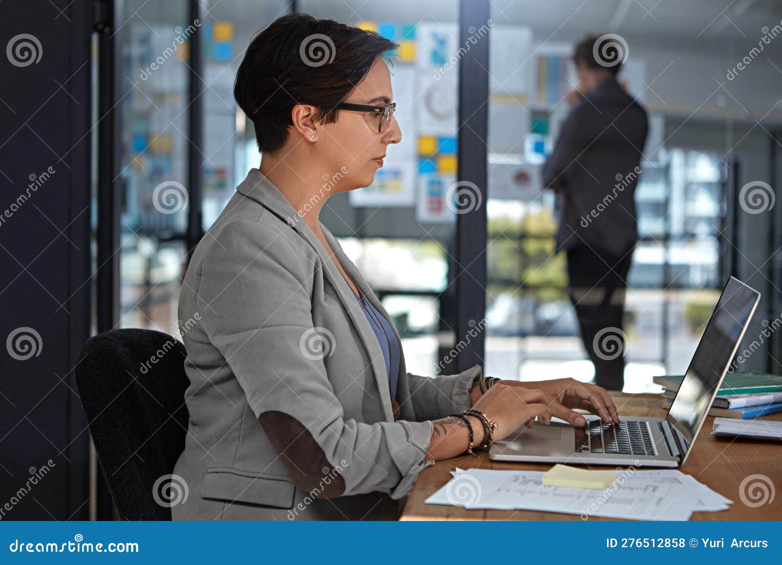 Working Away. a Businesswoman Working in Her Office. Stock Photo ...