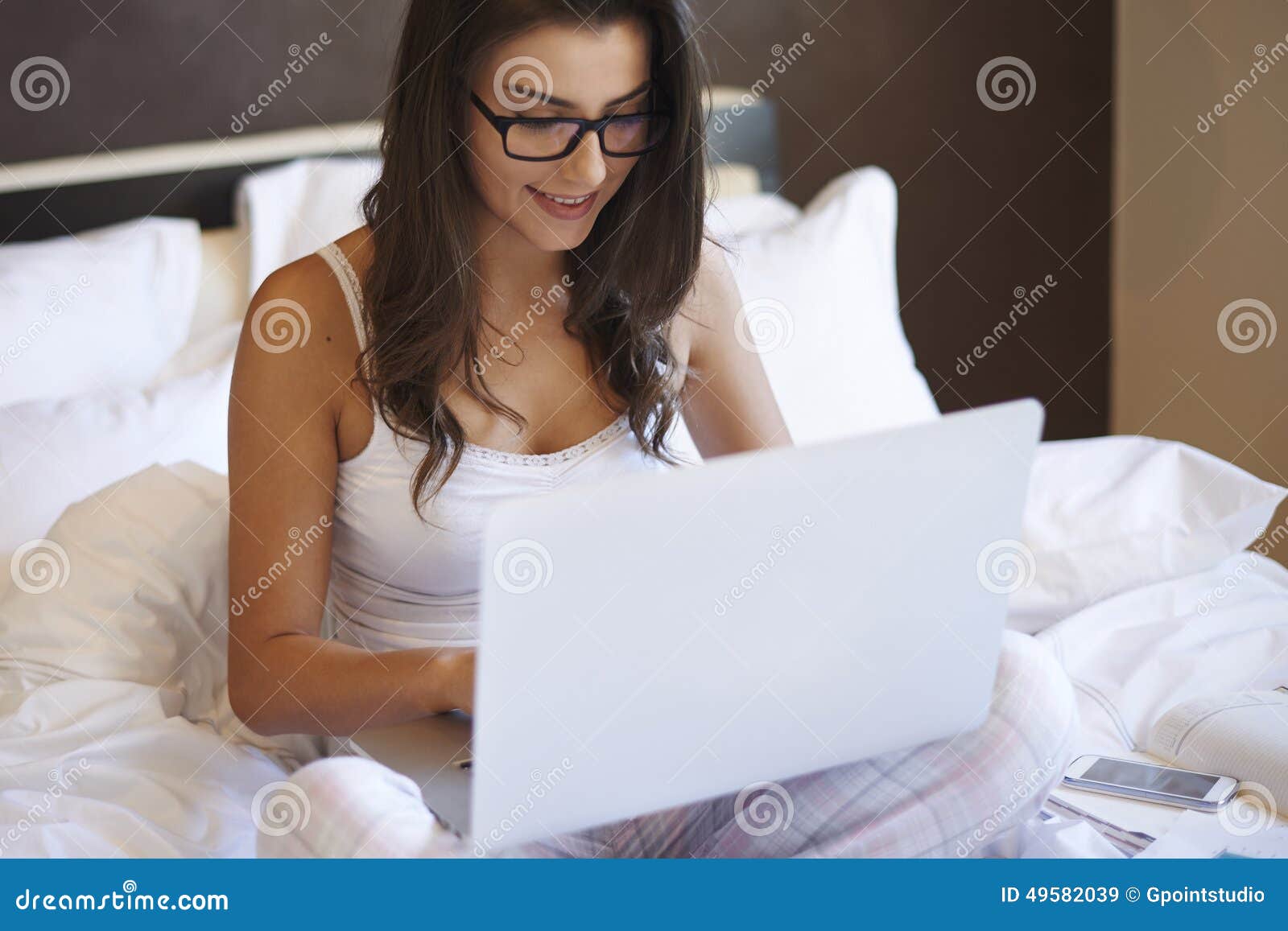 Working in bed stock image. Image of examining, home - 49582039