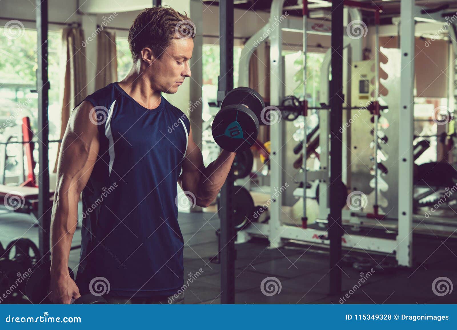 Working on biceps stock photo. Image of weightlifting - 115349328