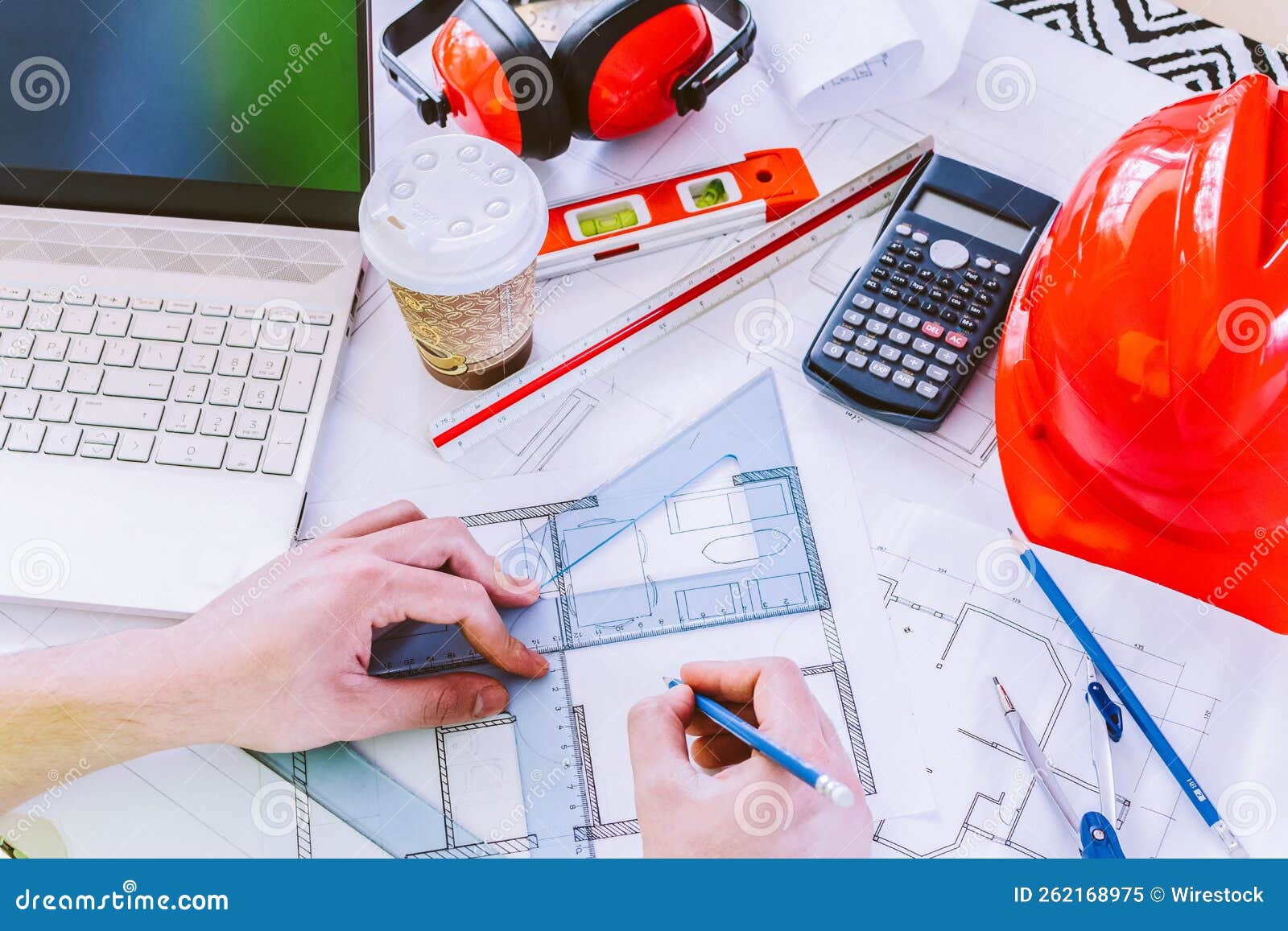 Working on a Blueprint, Engineer Sketching a Construction Project ...