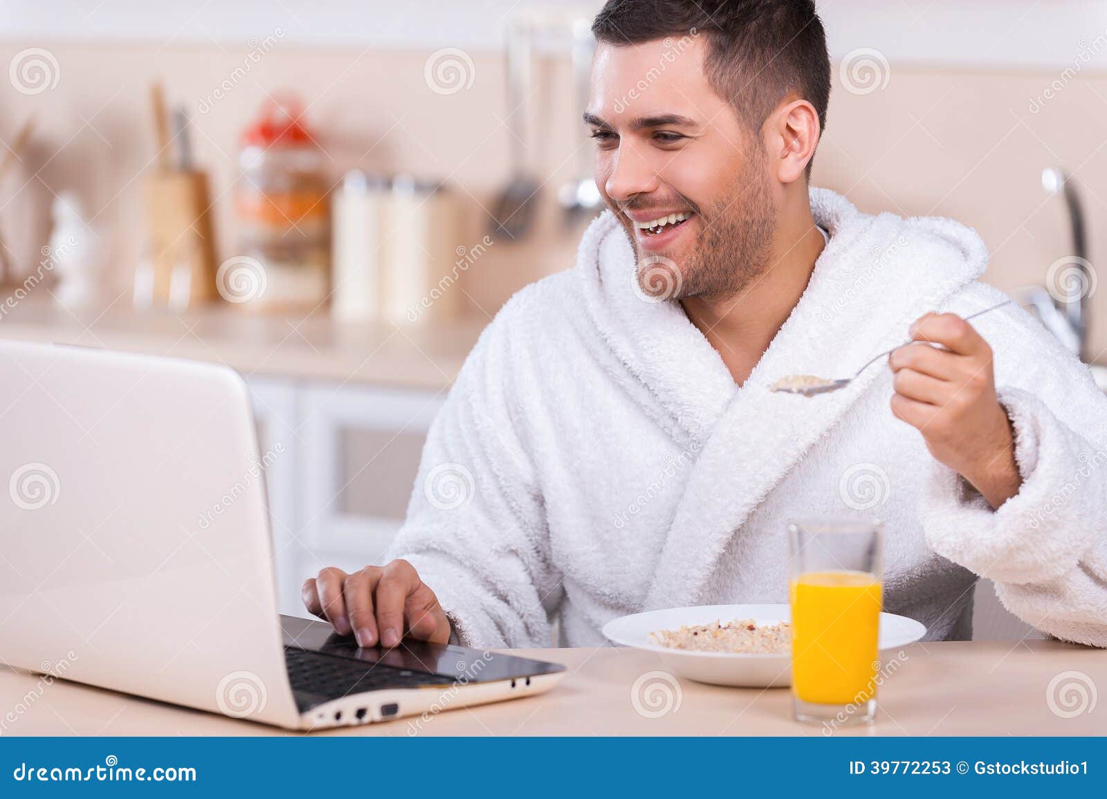 Working during breakfast. stock image. Image of laptop - 39772253
