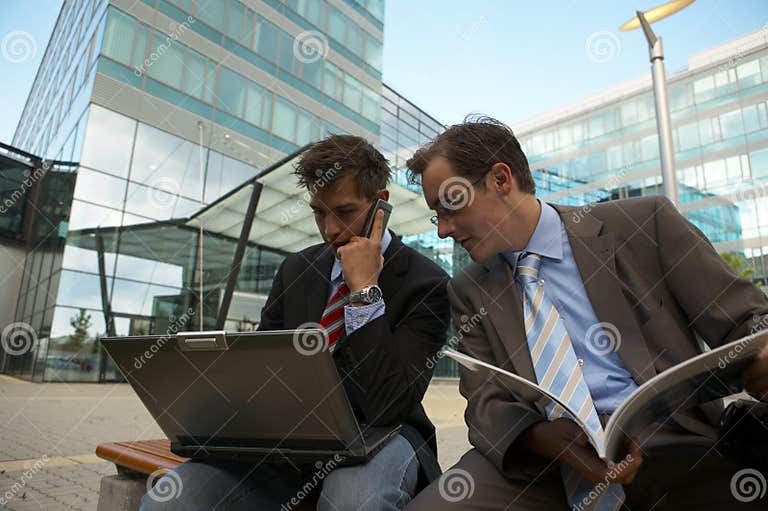 Working business men stock photo. Image of handsome, reading - 3131518