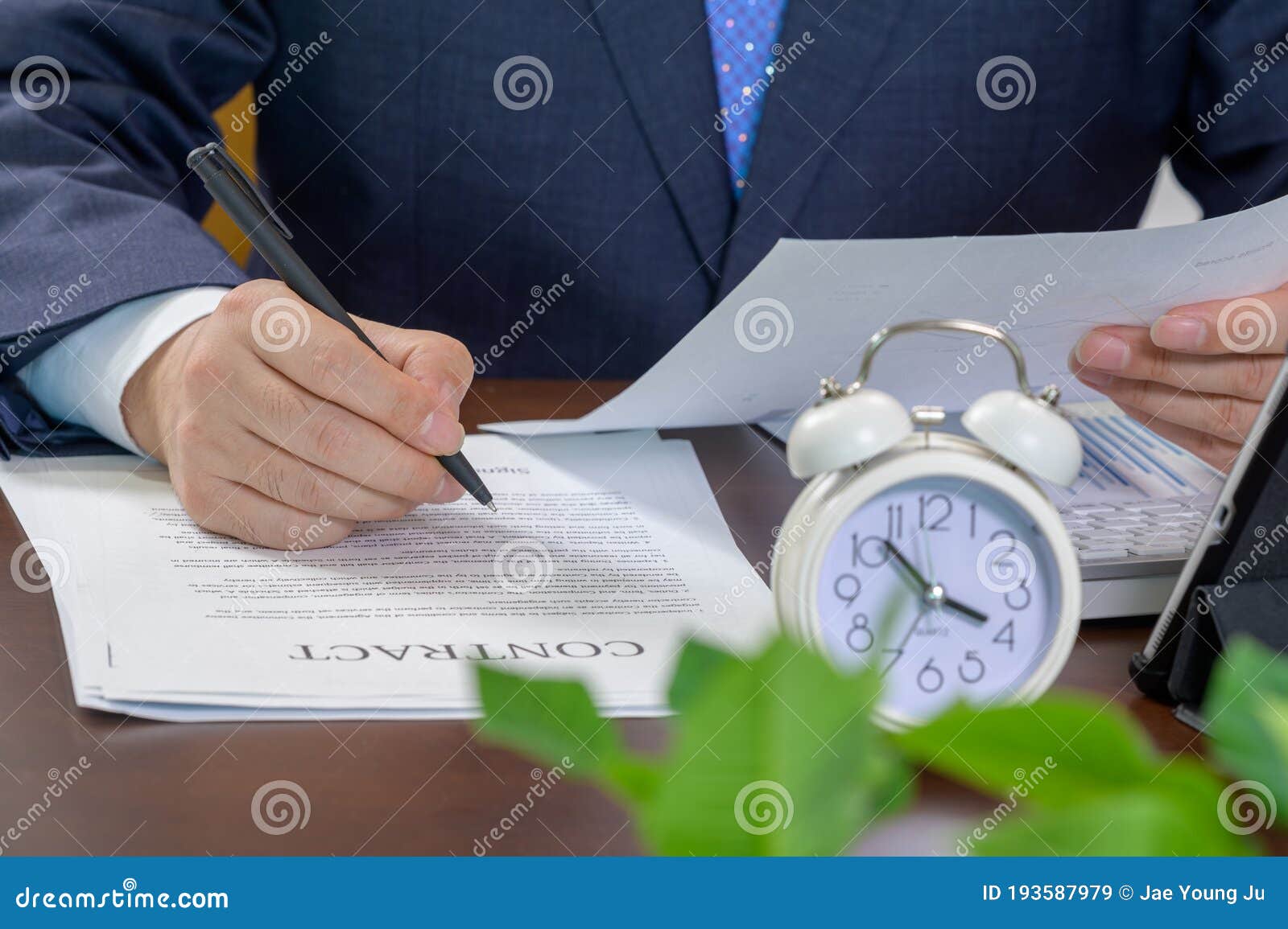Working Businessman and White Alarm Clock. Work Time Concept Stock ...