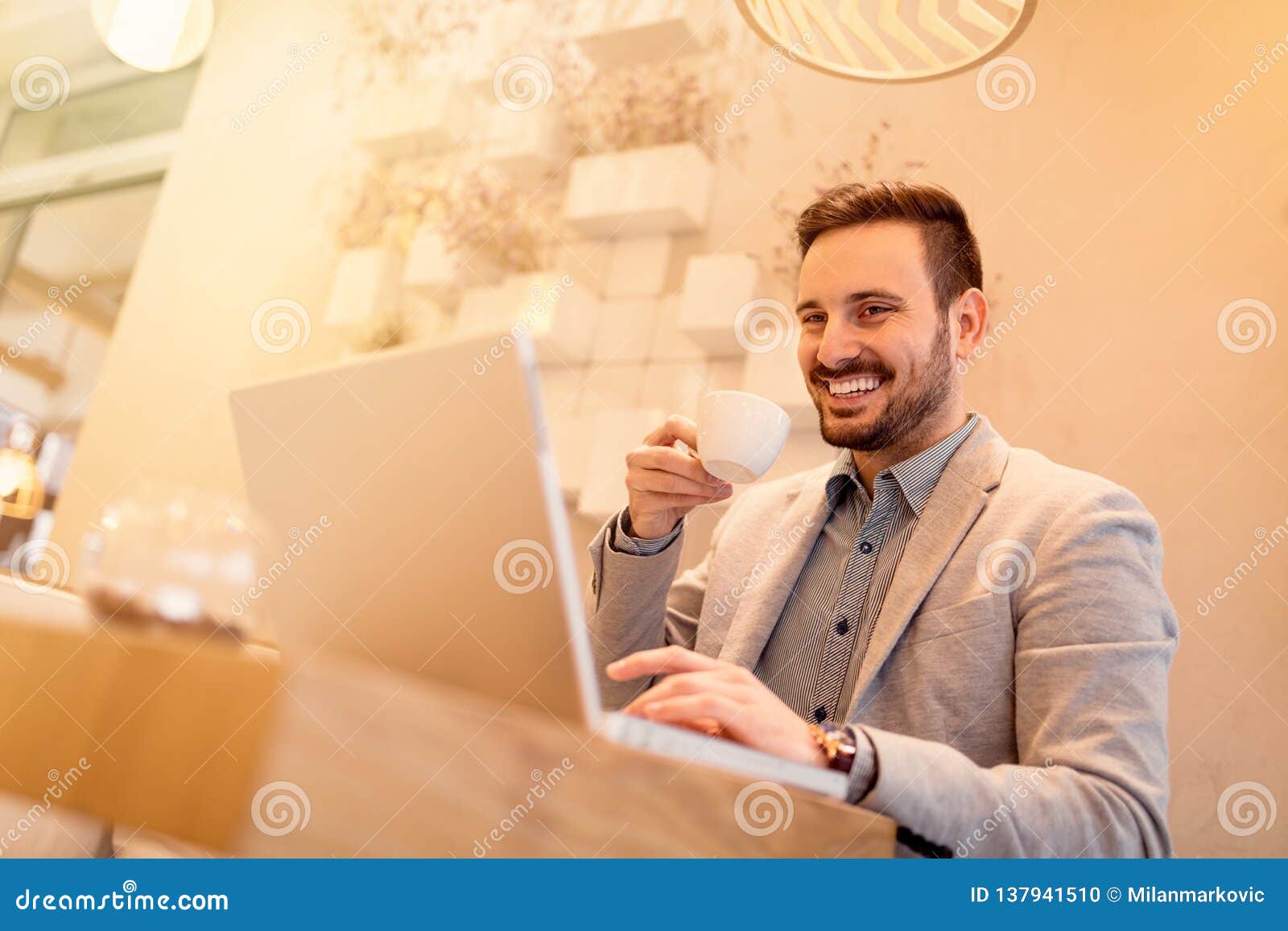 Working in a Cafe stock photo. Image of horizontal, cafe - 137941510