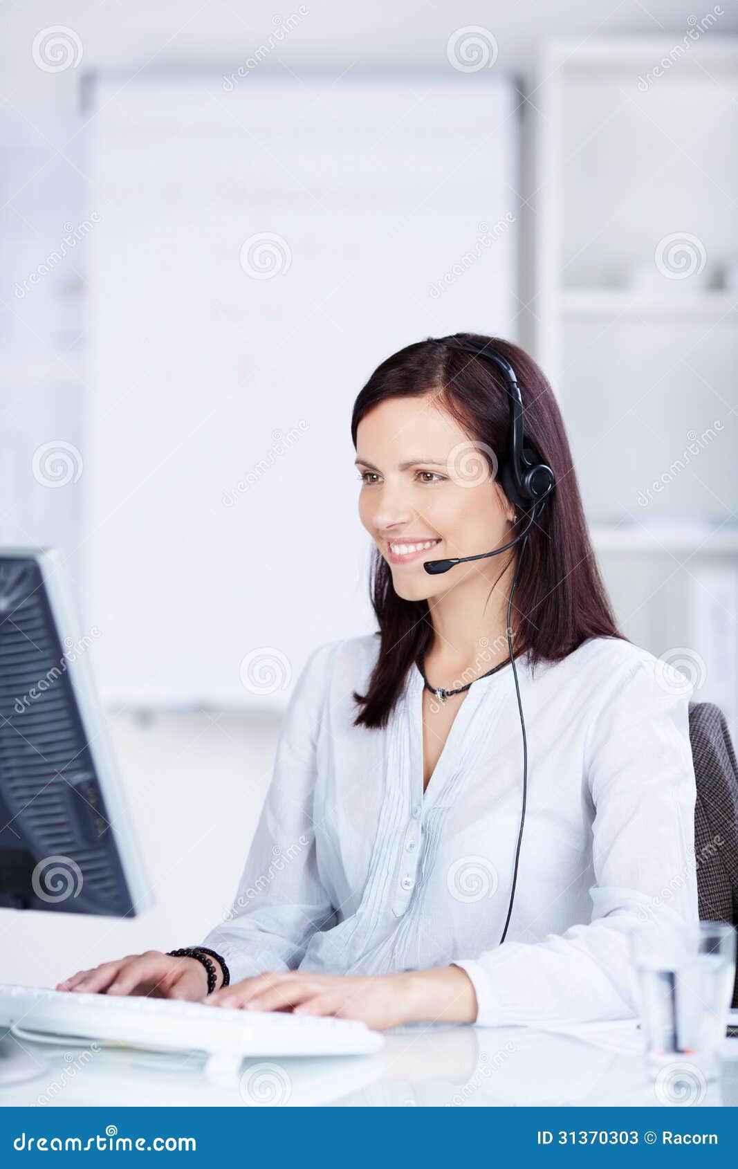 Working call center agent stock image. Image of brunette - 31370303