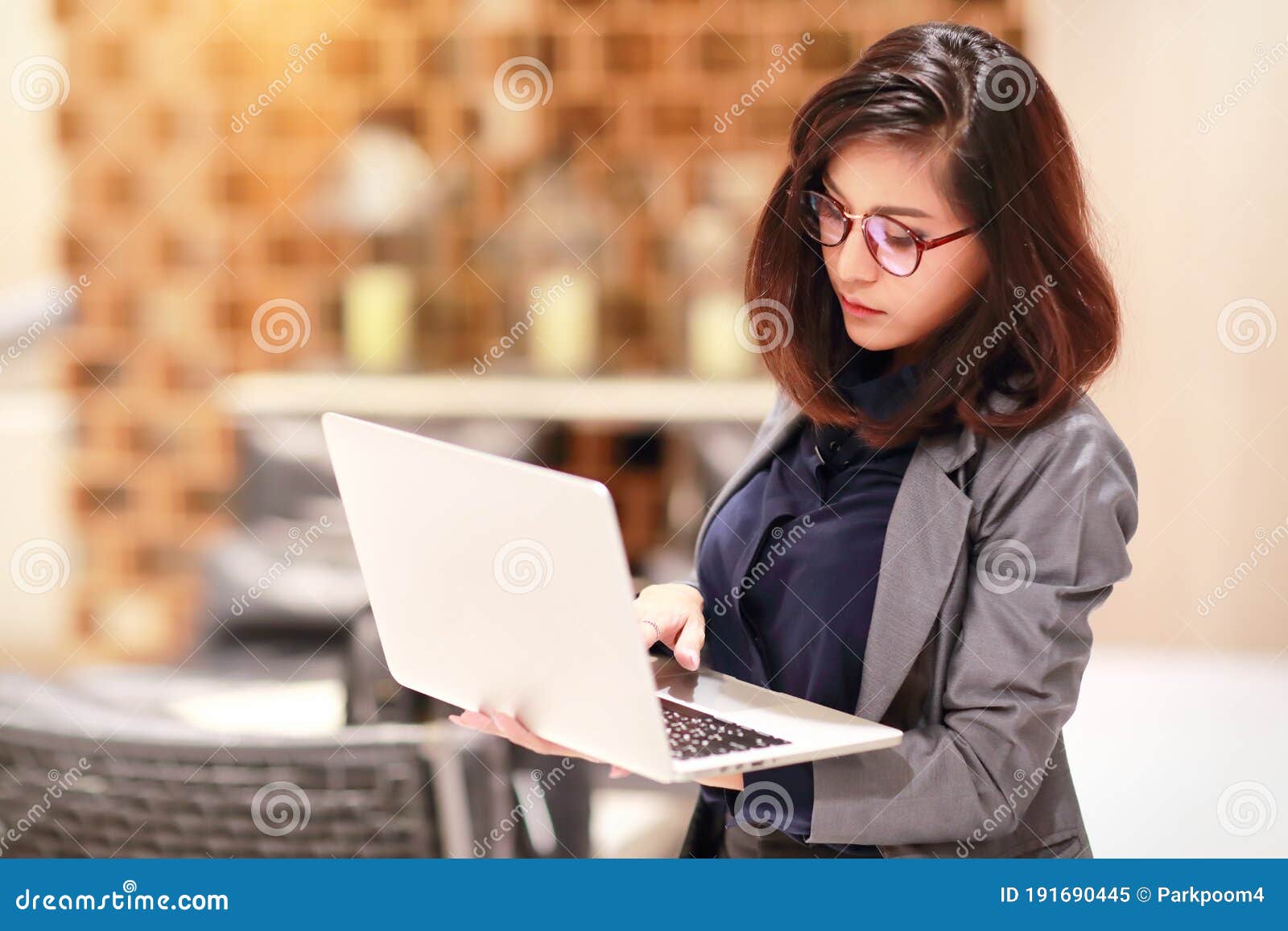 Working and Charming Woman with Glasses Using Laptop Computer Work from ...
