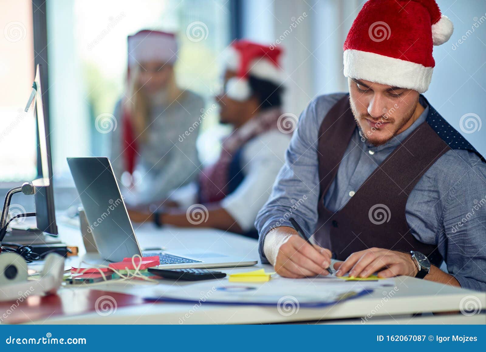 Working at Christmas at Office. Man Work in Office in Xmas Stock Image ...