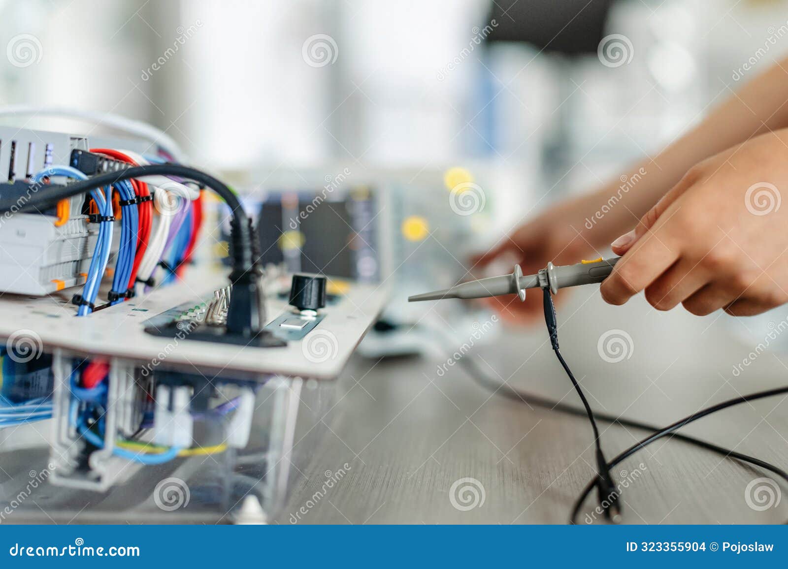 Working on Circuit Board, Building Robot in after-school Robotics Club ...