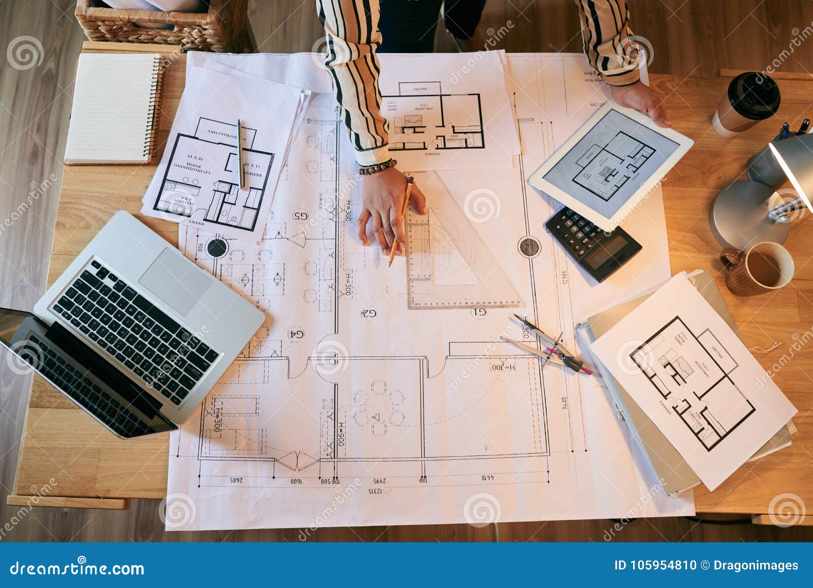 Working on Construction Project Stock Photo - Image of sitting ...