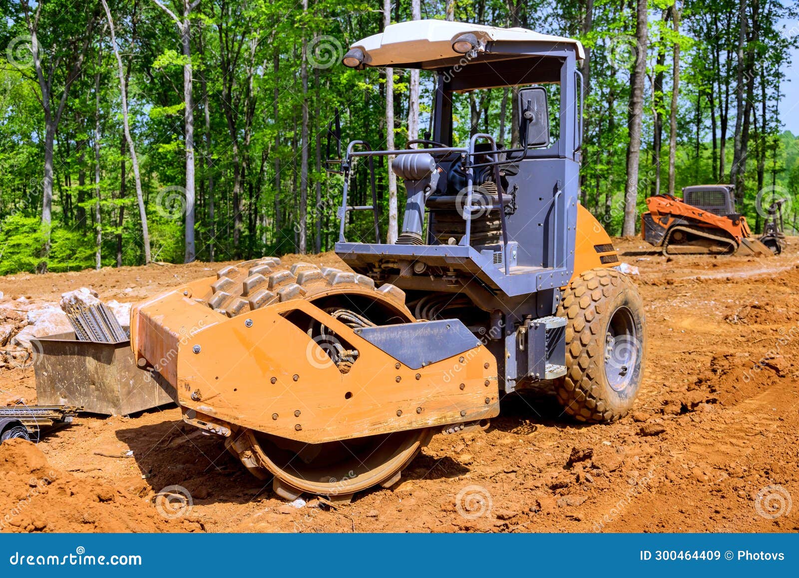 Working on a Construction Site with an Excavator Tractor Equipment ...