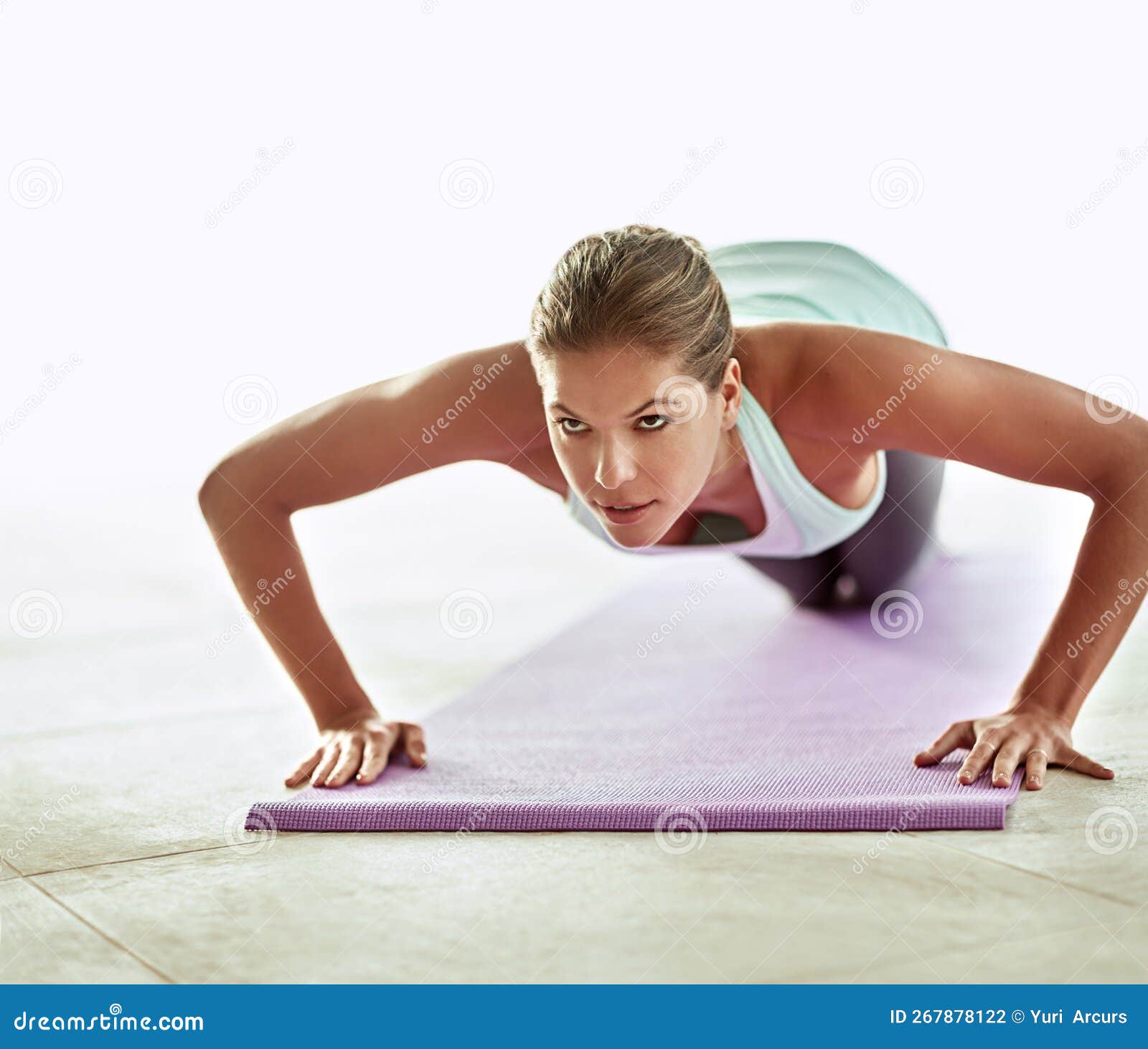Working those Core Muscles. a Young Woman Doing Push-ups during a ...