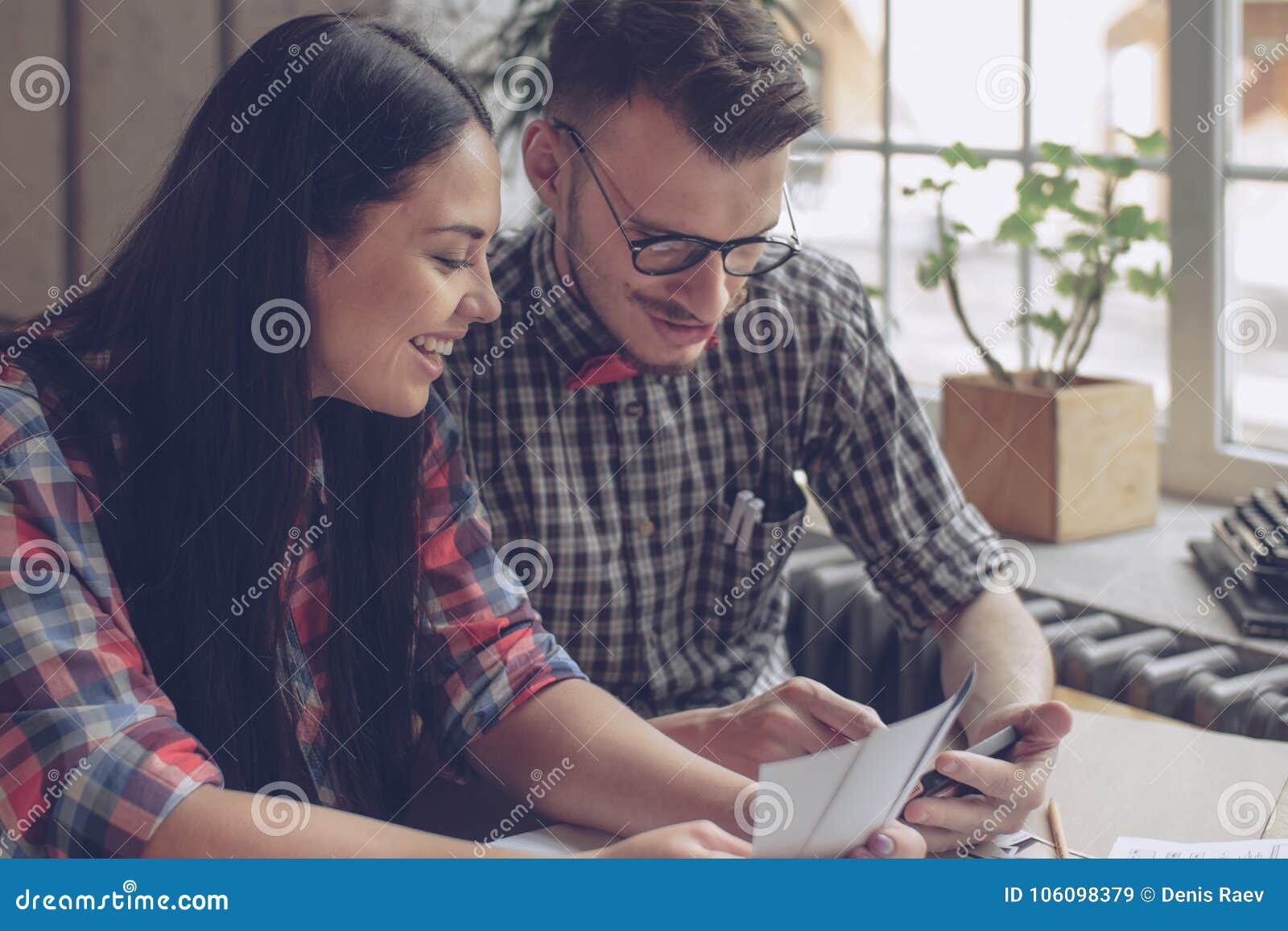 Working couple indoors stock image. Image of working - 106098379