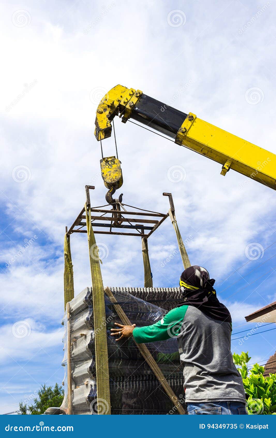 Working crane editorial image. Image of activity, helmet - 94349735
