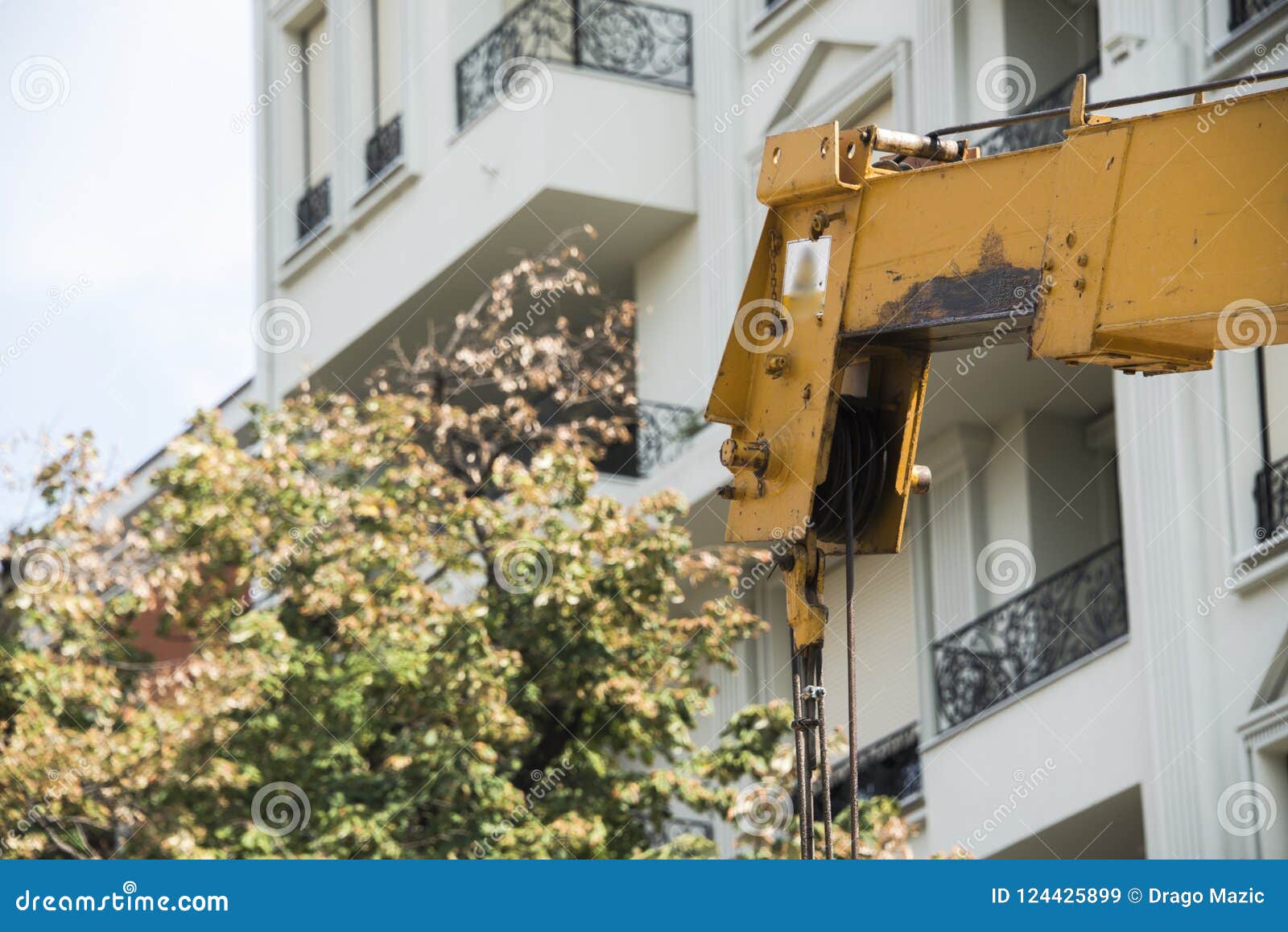 Working with a Crane and Lifting Pipes on the Building Stock Image ...
