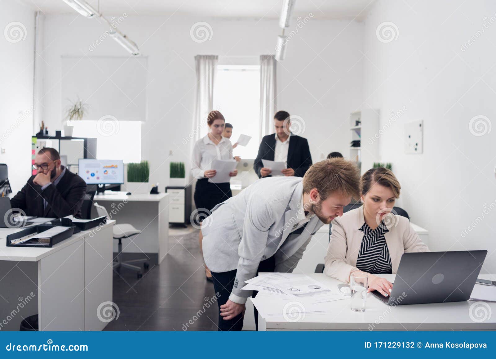 Working Day in the Office, Men and Women in Suits are Busy with Their ...