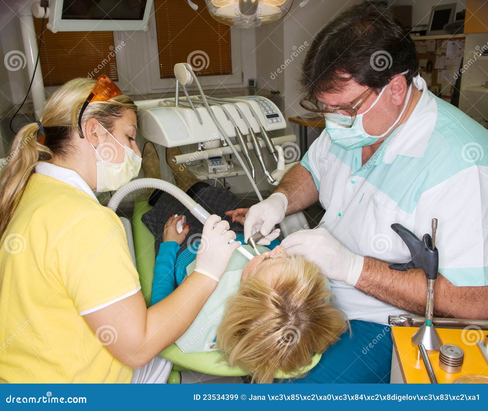 Working dental team stock image. Image of examination - 23534399