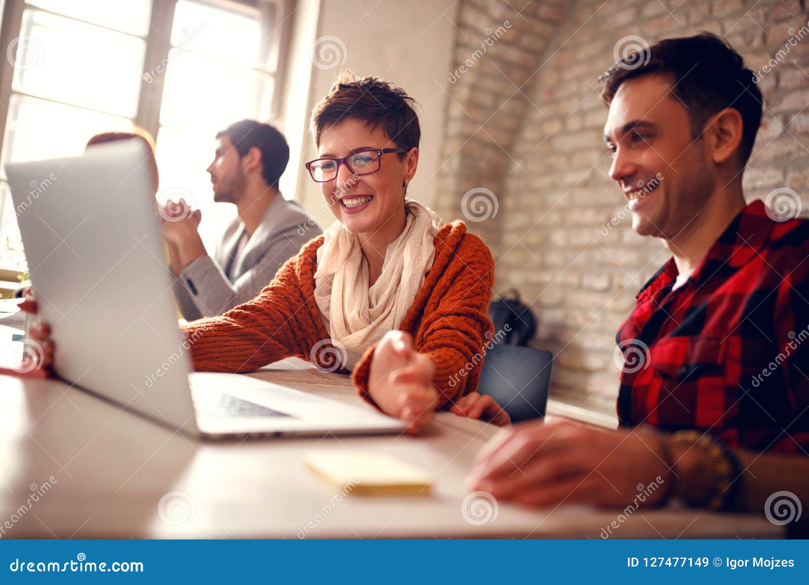 Working on Design- Designer Couple in Good Mood Working Together Stock ...