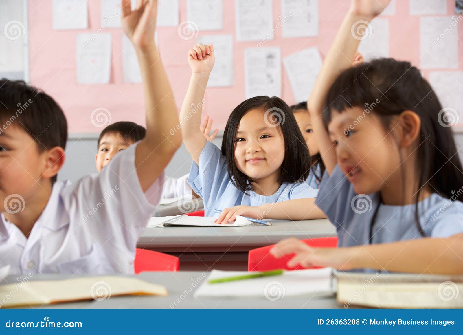 Working at Desks in Chinese School Stock Photo - Image of group ...