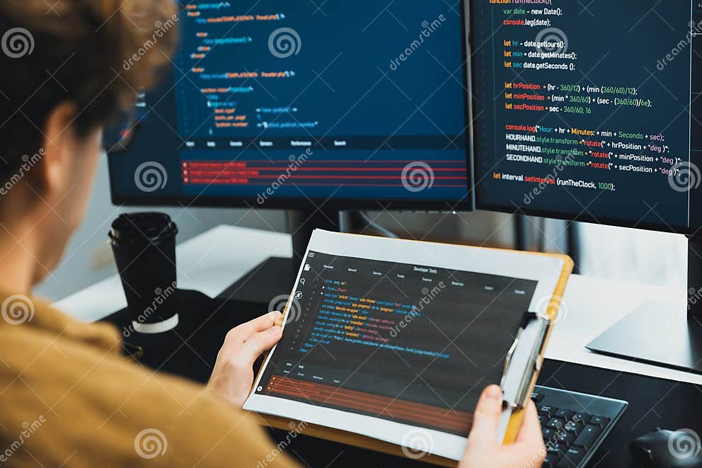 It Developer Reading Coding on Document Paper Software with Screens. Gusher. Stock Photo - Image ...