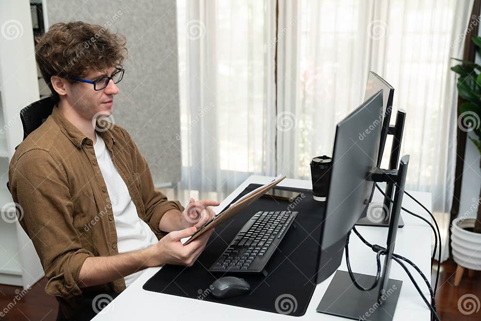 It Developer Reading Online Software Development on Document Report. Gusher. Stock Photo - Image ...