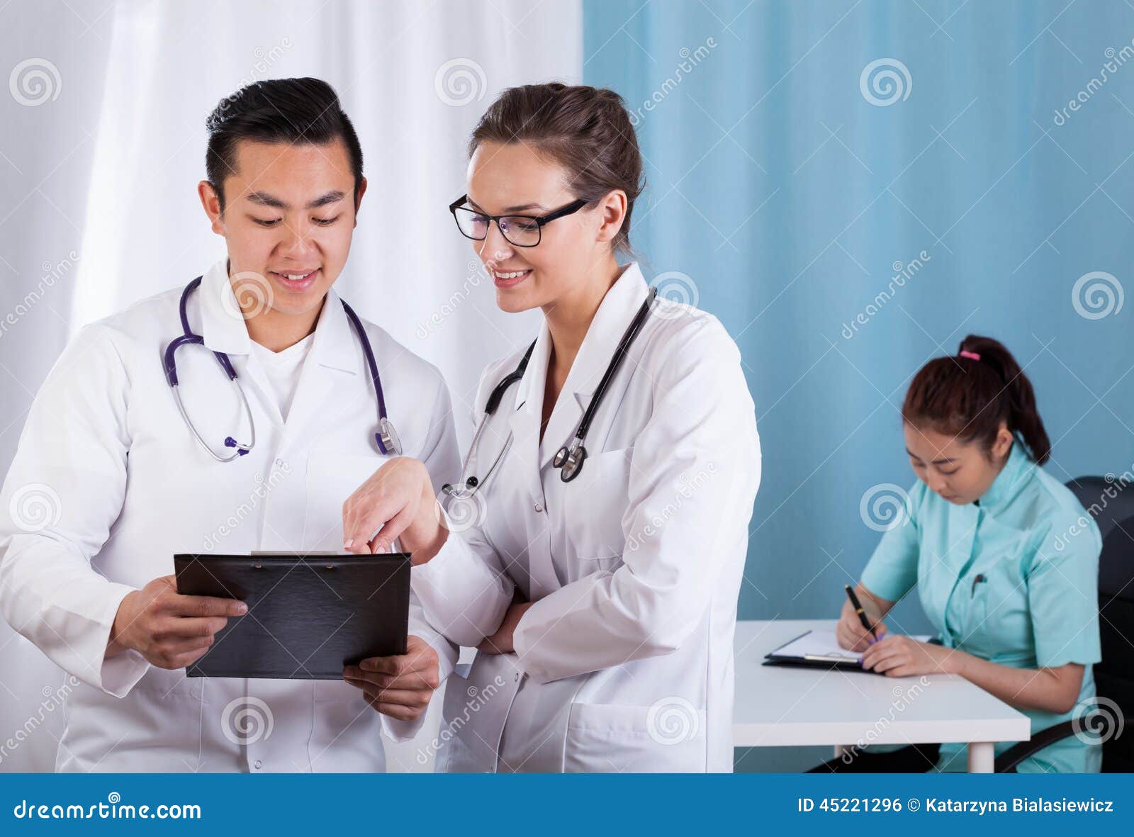 Working in the Doctor S Office Stock Photo - Image of doctors ...