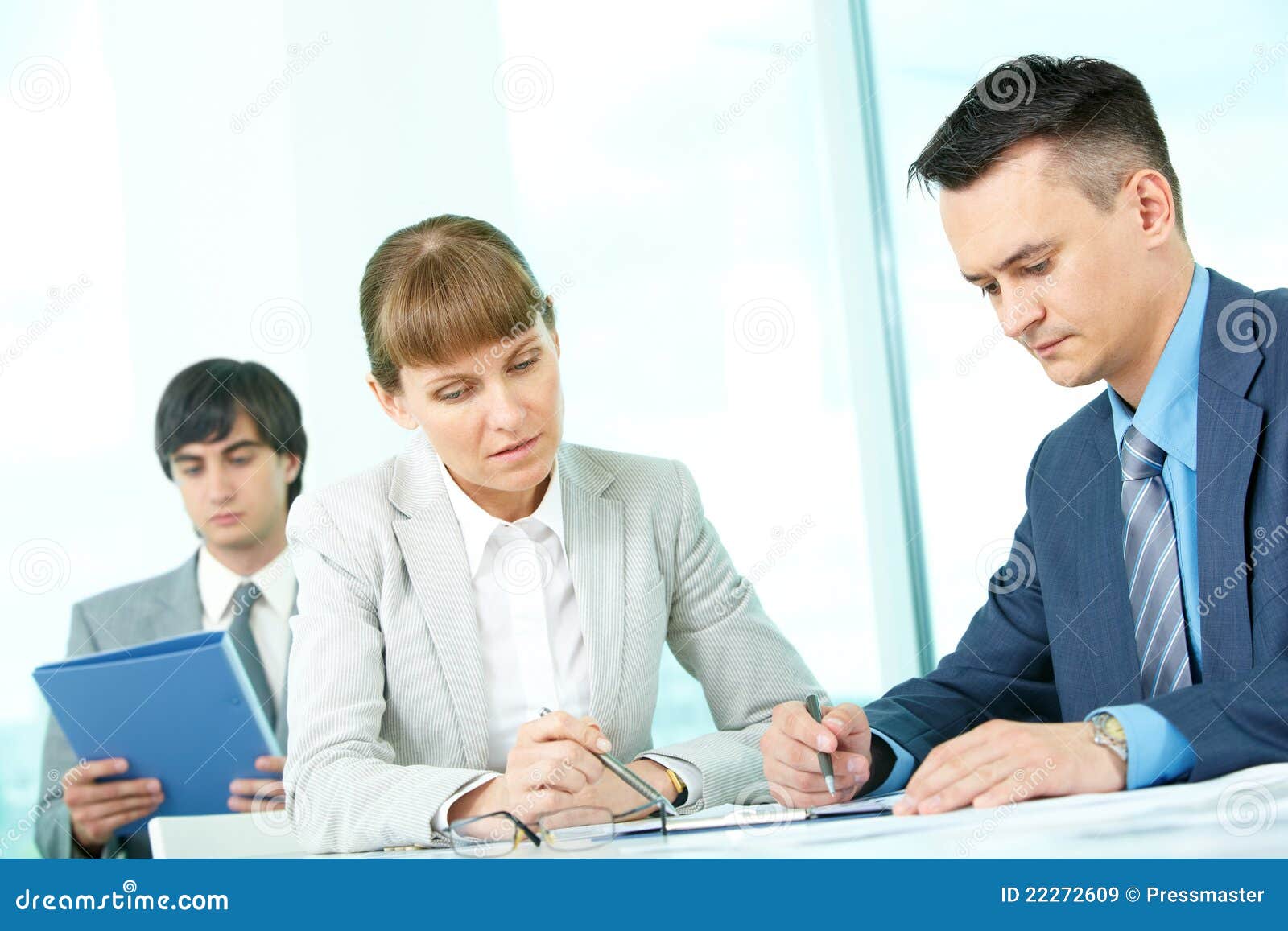 Working employees stock image. Image of pensive, brainstorming - 22272609
