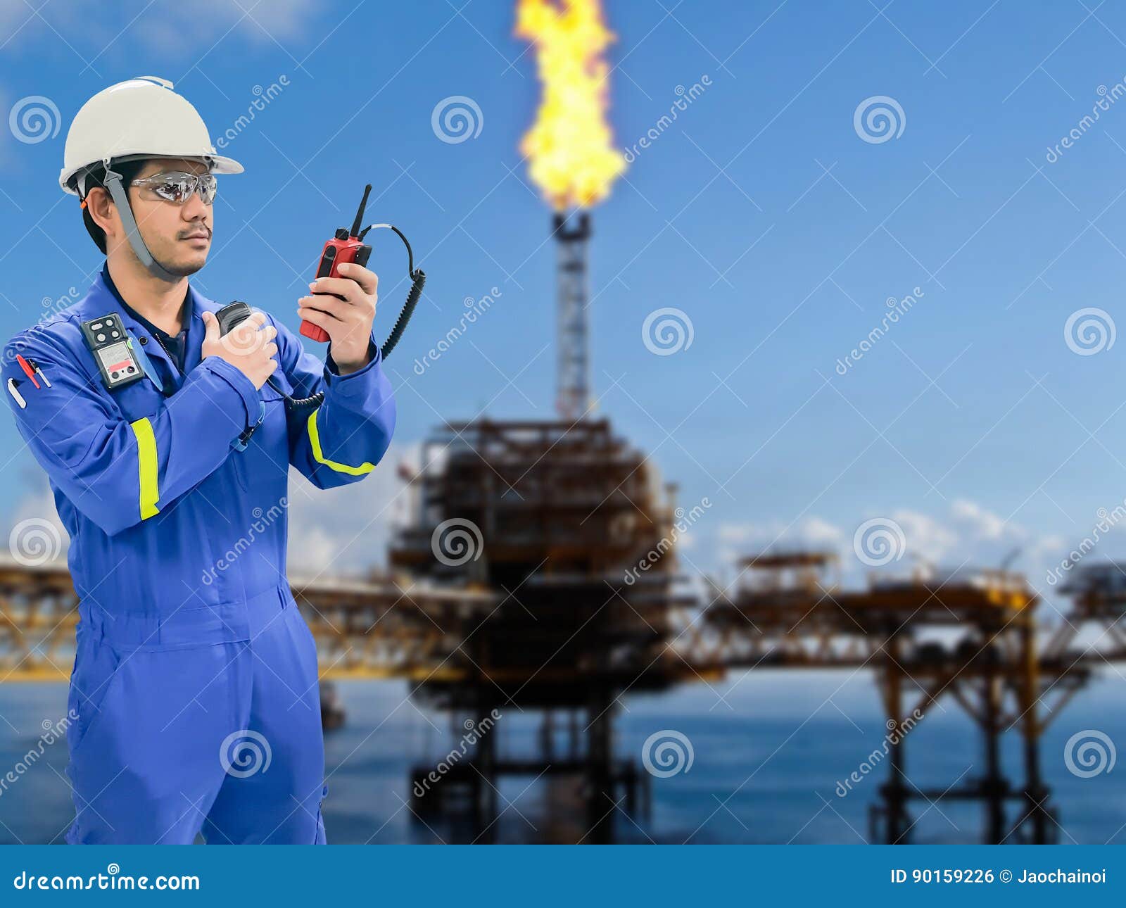 Working Engineer at Offshore Oil and Gas Refinery Stock Photo - Image ...