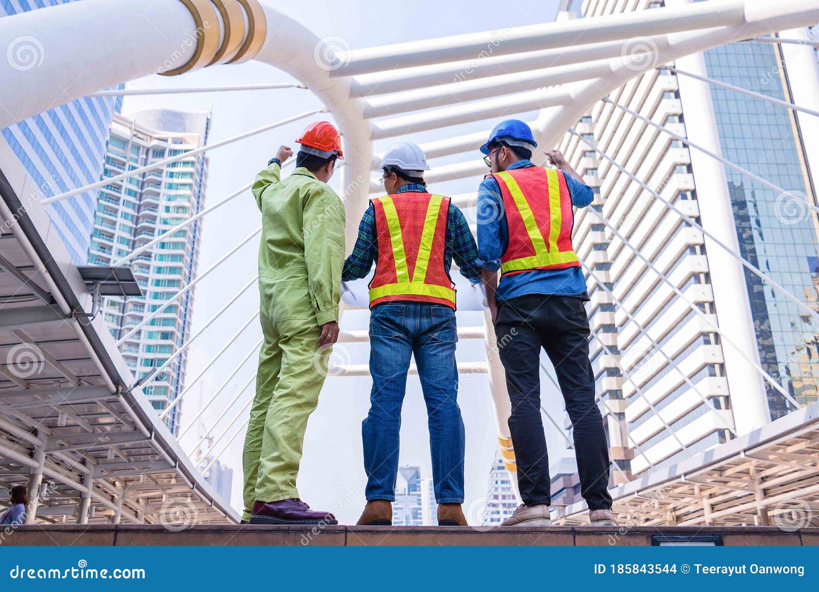 Working Engineer.they are Standing and Seeing on Building Stock Photo ...