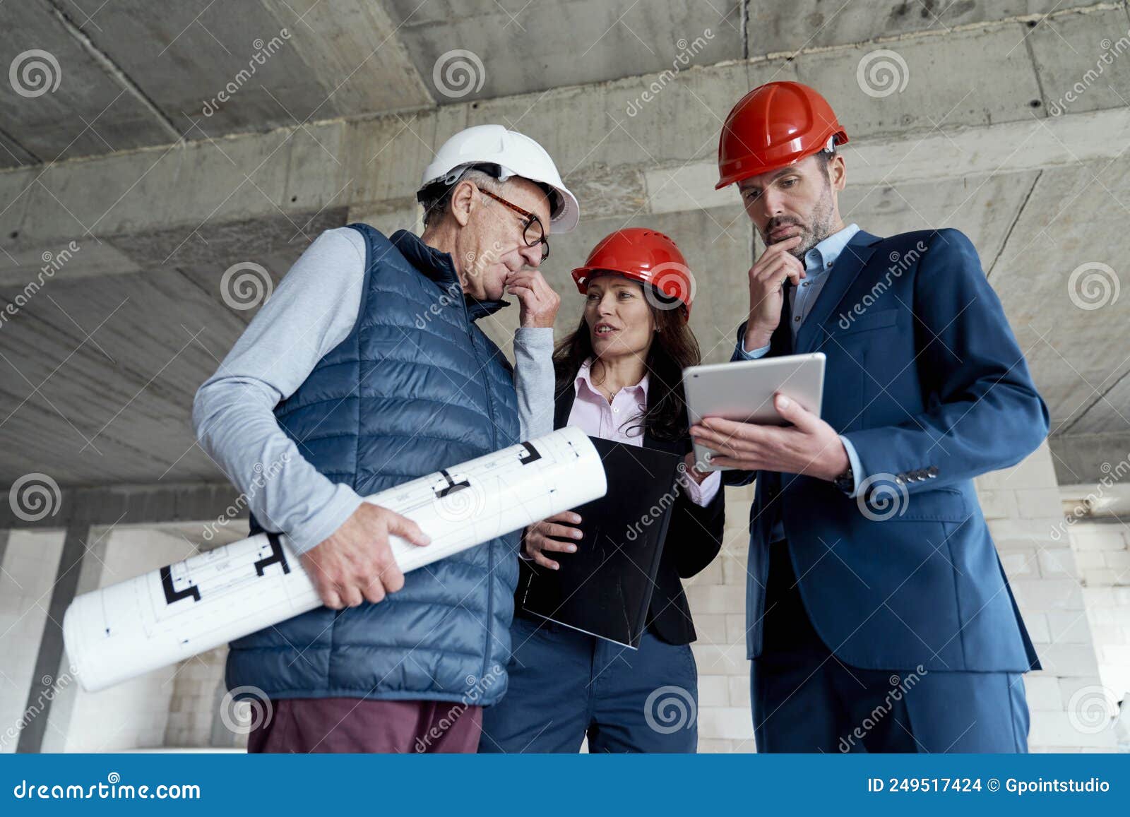 Working Engineers on the Construction Site Stock Photo - Image of ...
